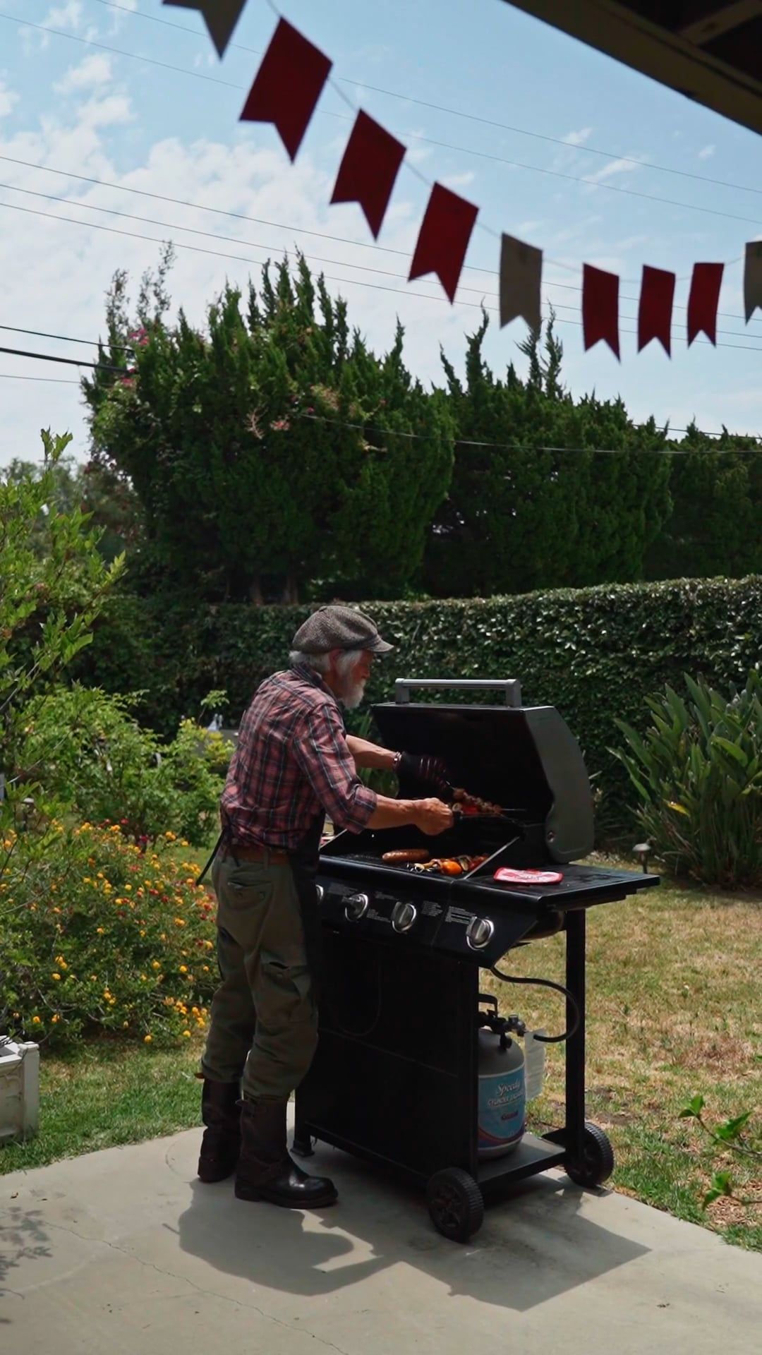A Man Standing Near the Grill · Free Stock Video