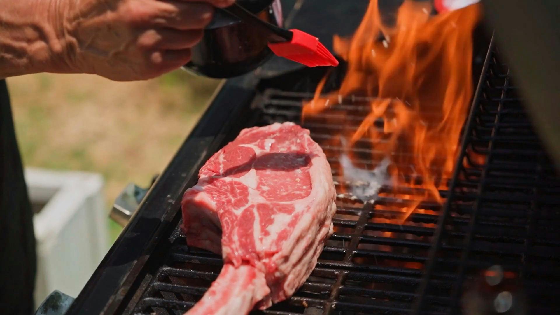 A Person Cooking Meat on Grill Free Stock Video Footage, Royalty-Free ...