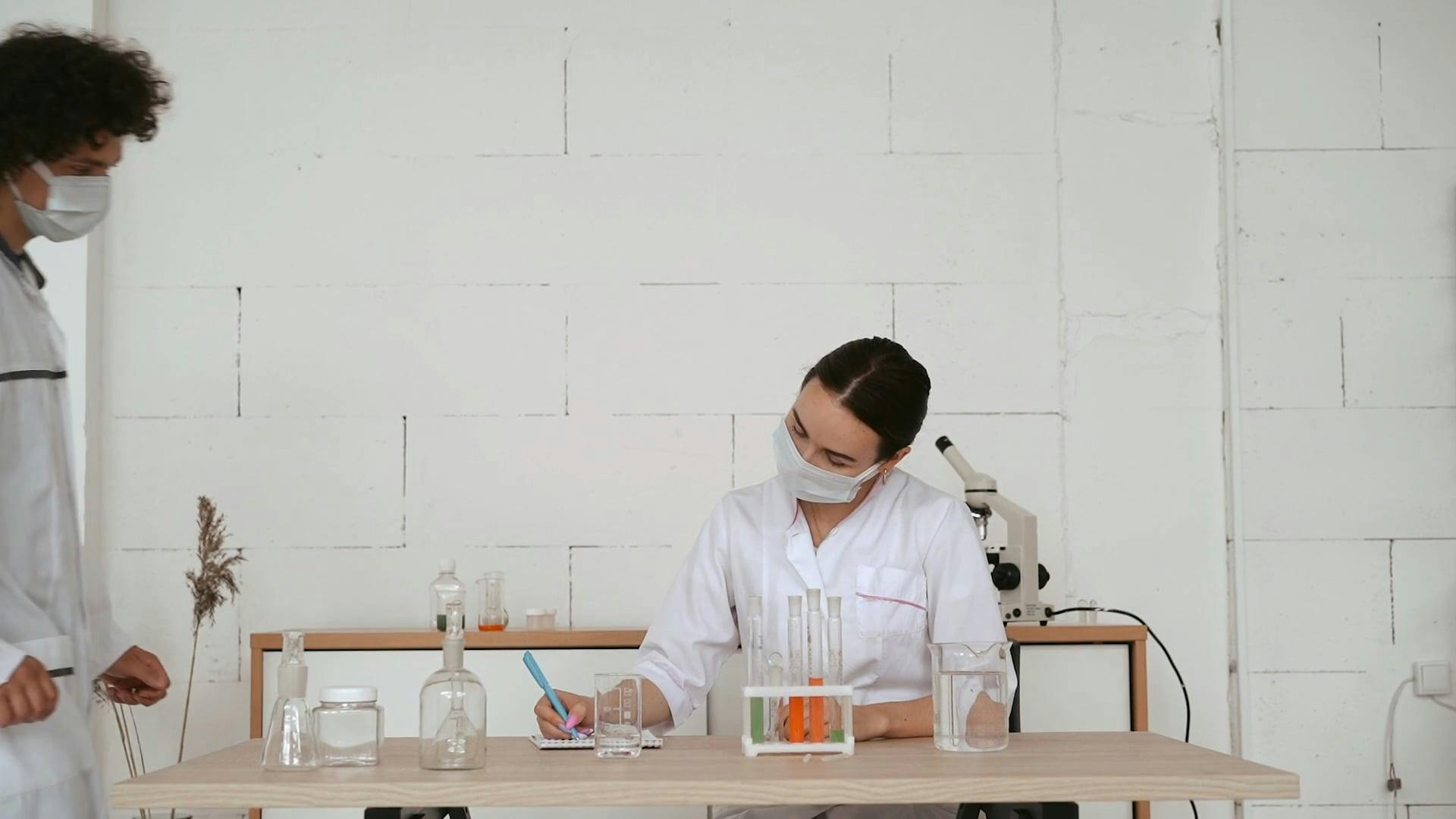 Biochemists Checking the Test Tube · Free Stock Video