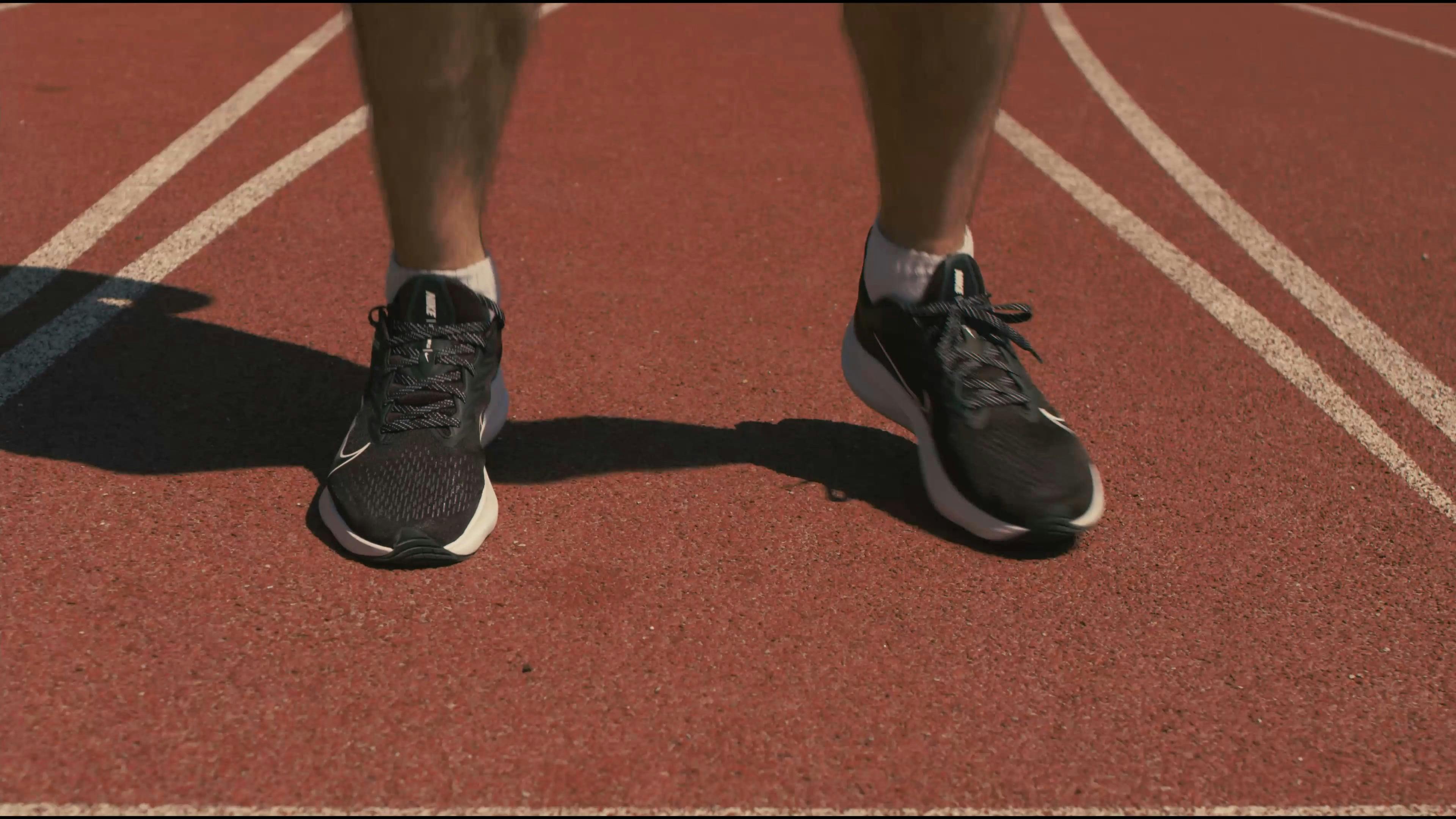 A Man on the Starting Line of a Running Track · Free Stock Video
