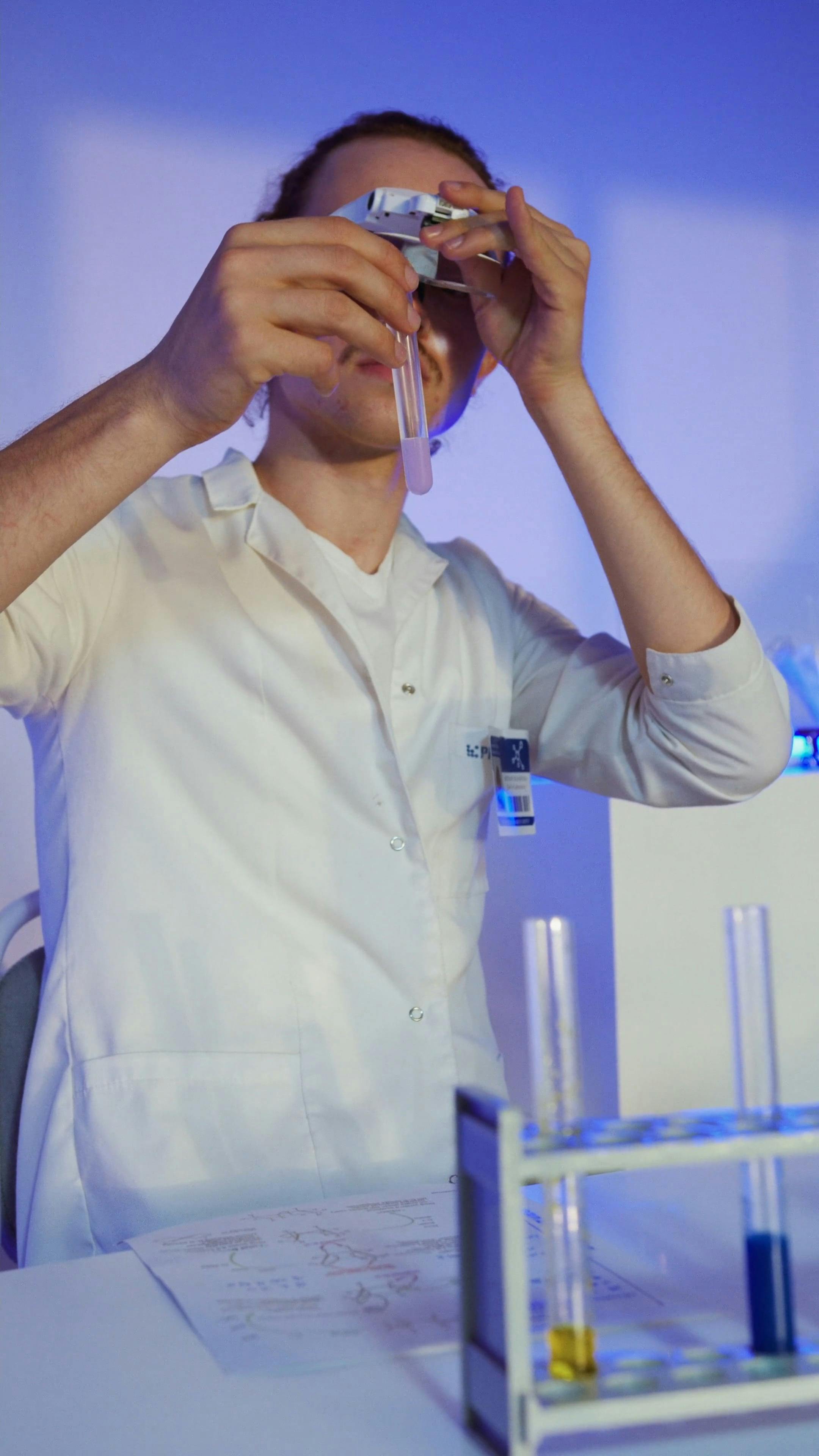 A Test Tube Rotator Machine in the Laboratory · Free Stock Video