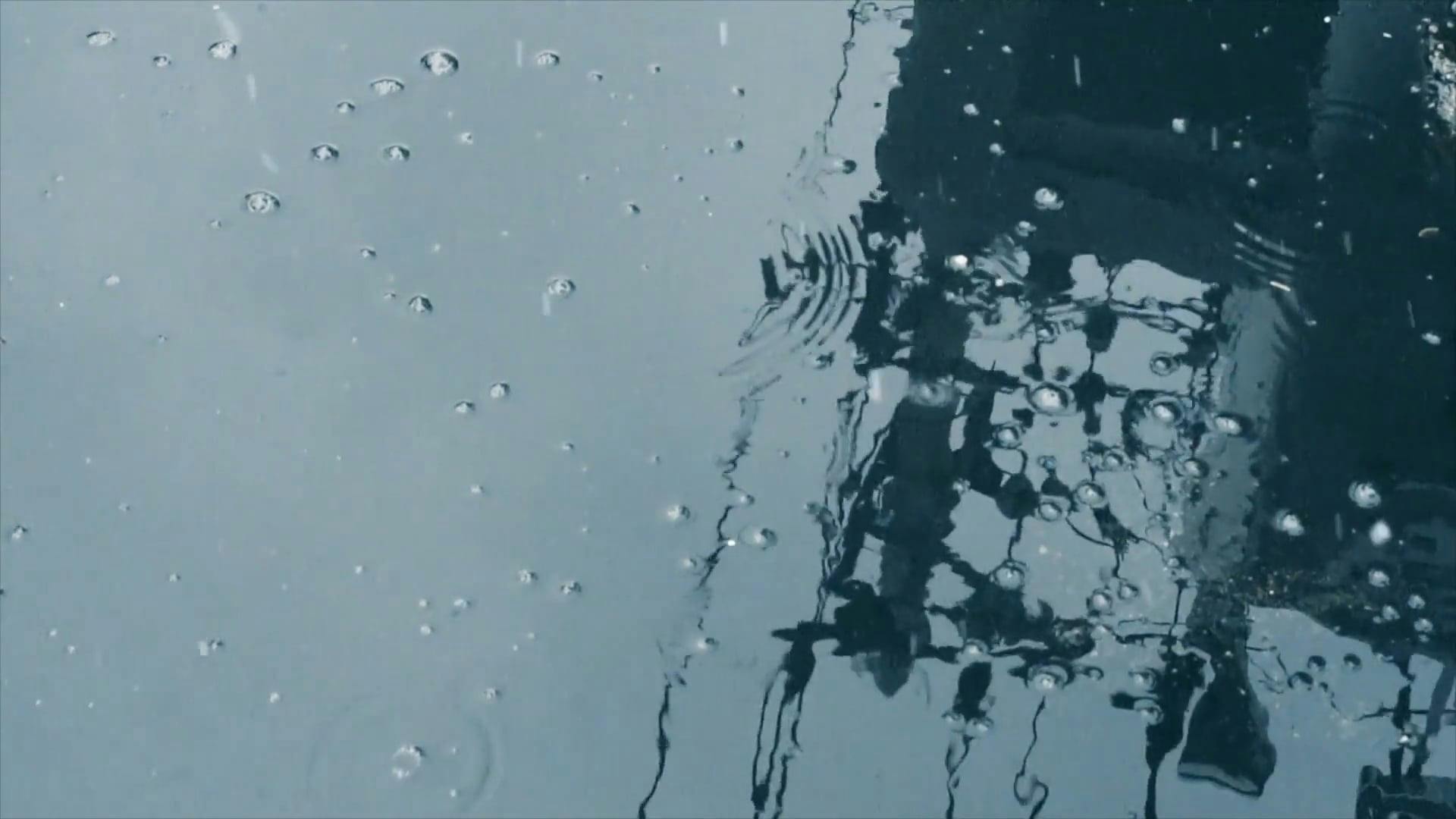 Snow Falling On Water · Free Stock Video