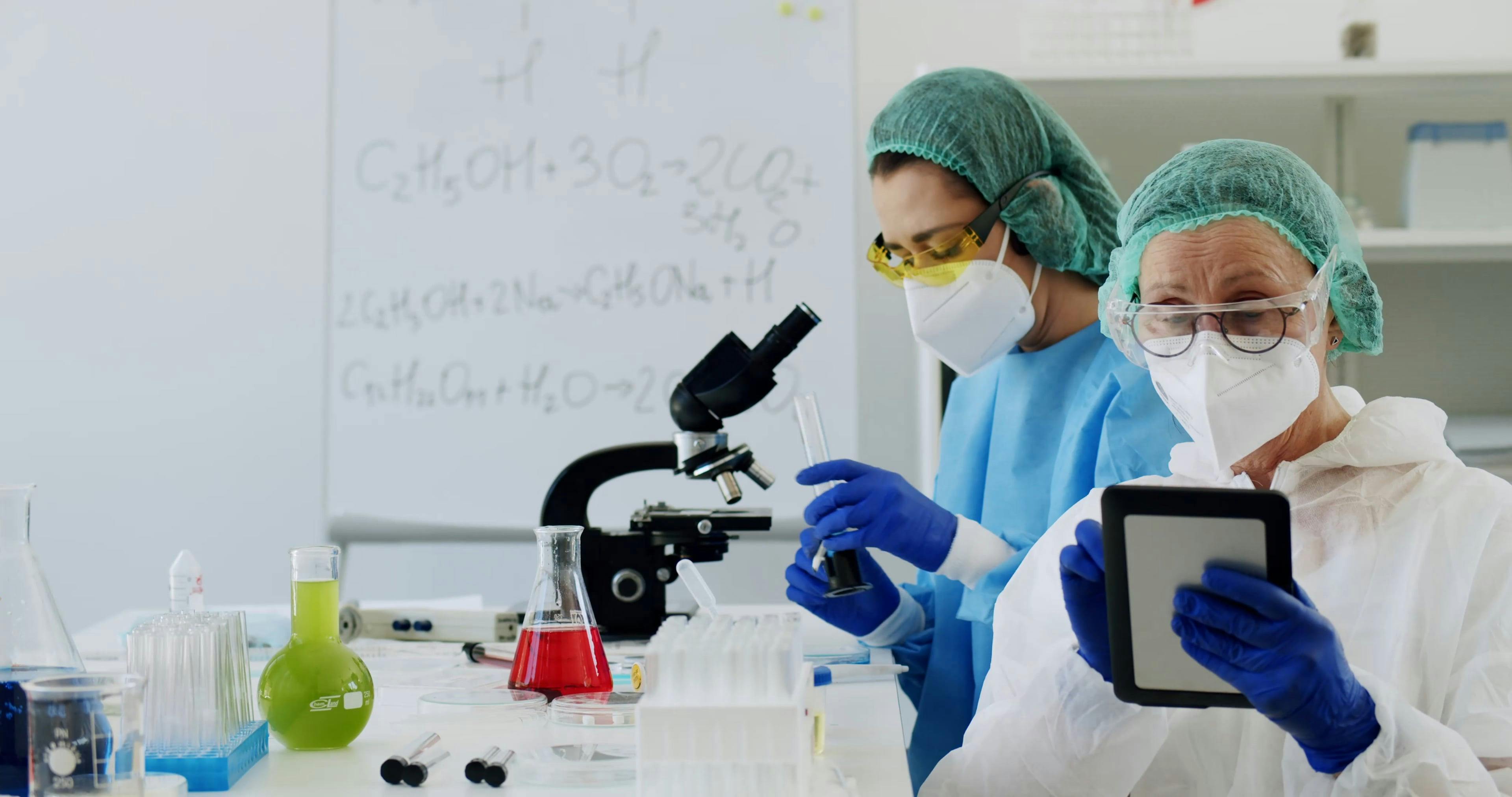 Women in PPE Working in the Laboratory Free Stock Video Footage ...