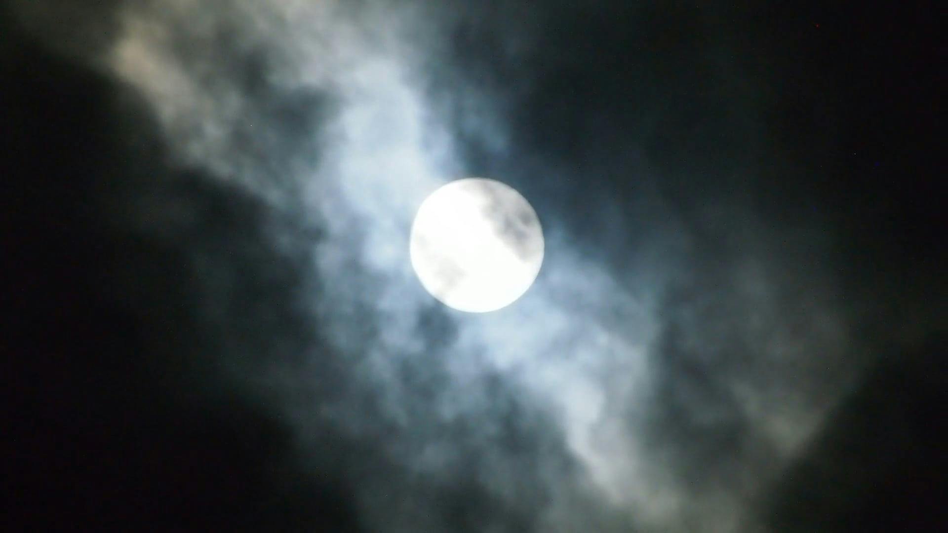 Full Moon Slowly Being Covered by Clouds · Free Stock Video