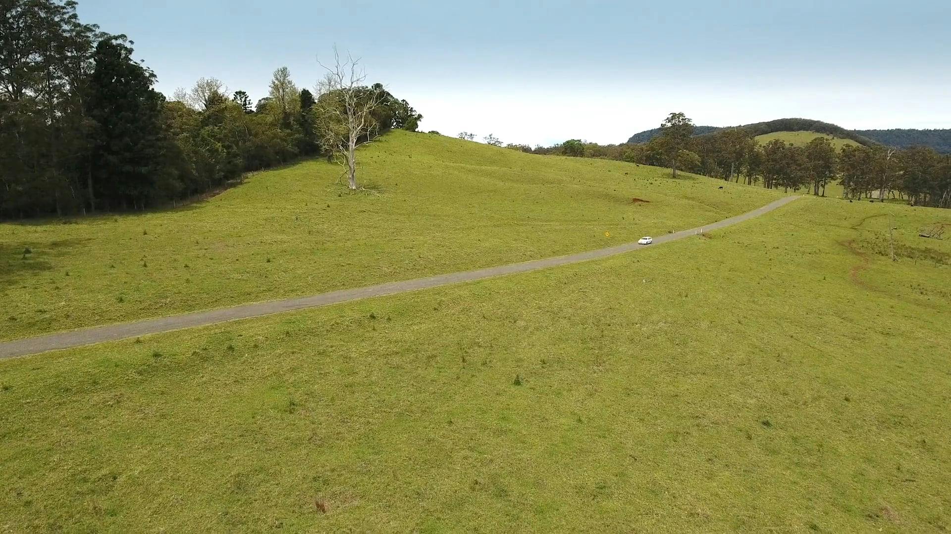 Aerial Shot Of Grass Hill · Free Stock Video