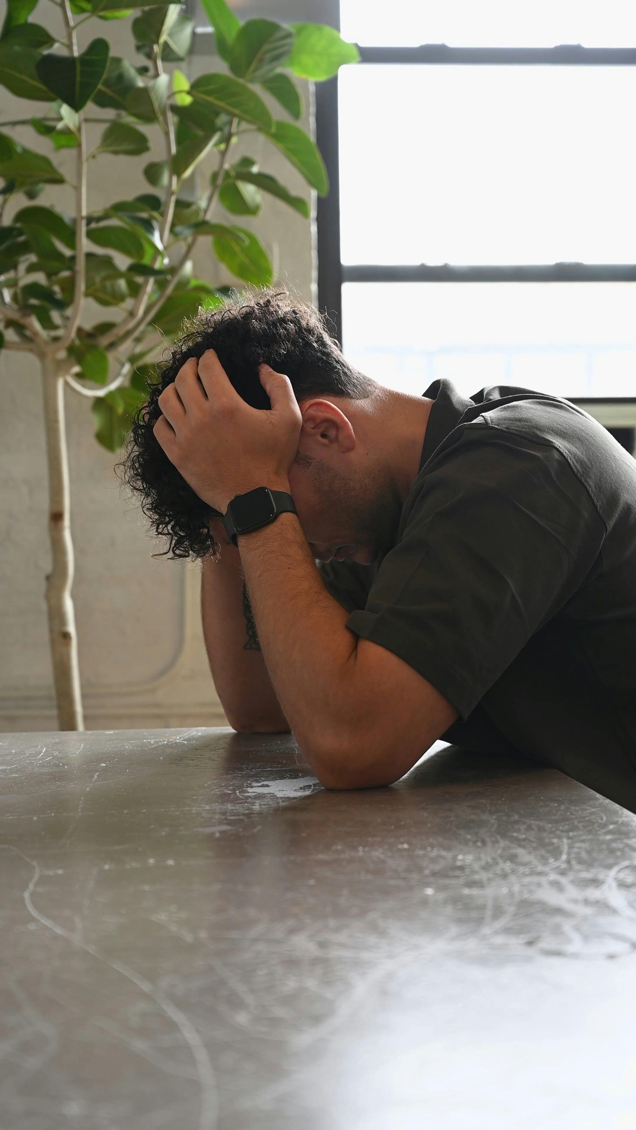 Problematic Man Holding His Head · Free Stock Video