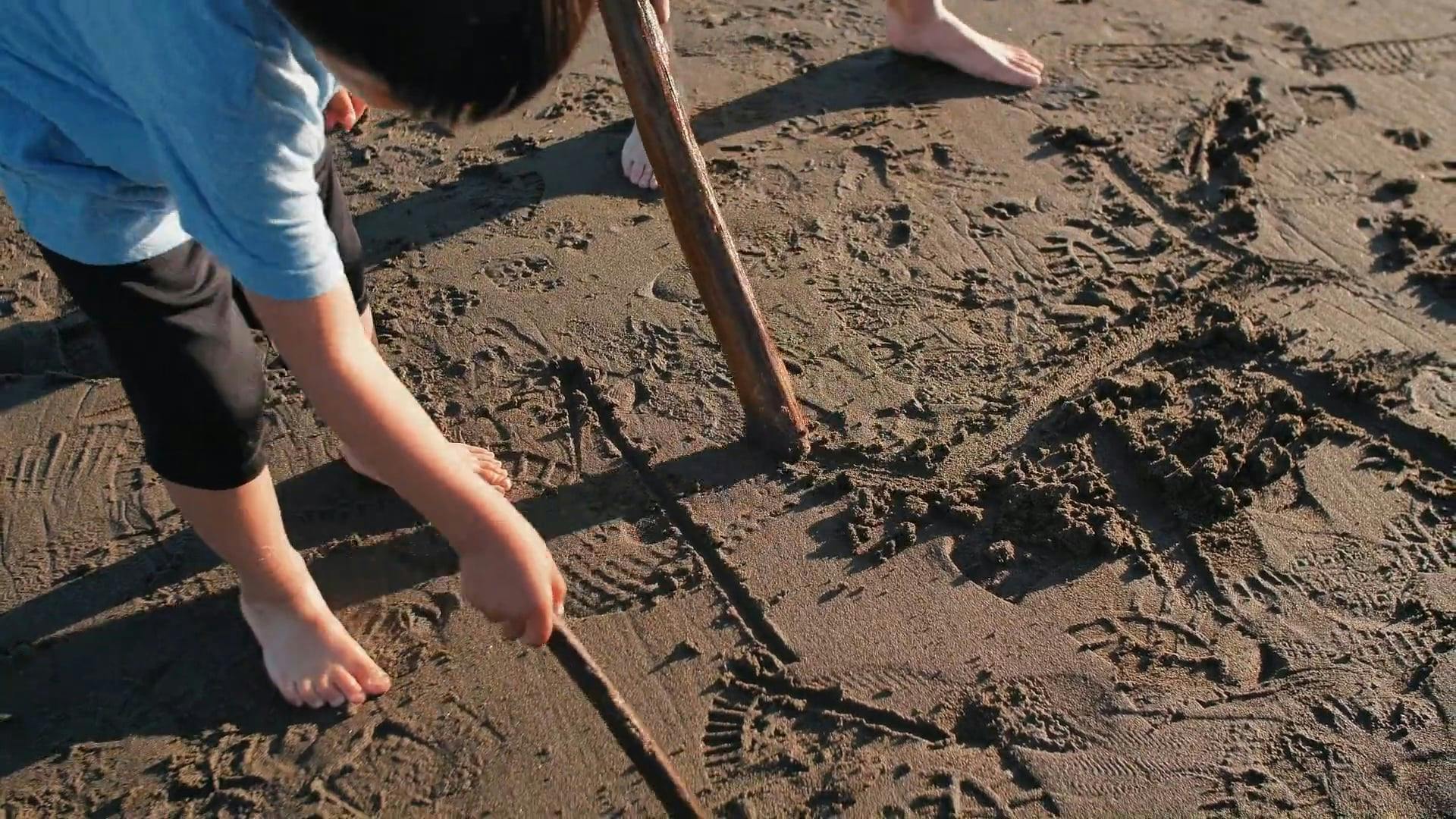 Kids Writing on Sand Using a Stick Free Stock Video Footage, Royalty ...