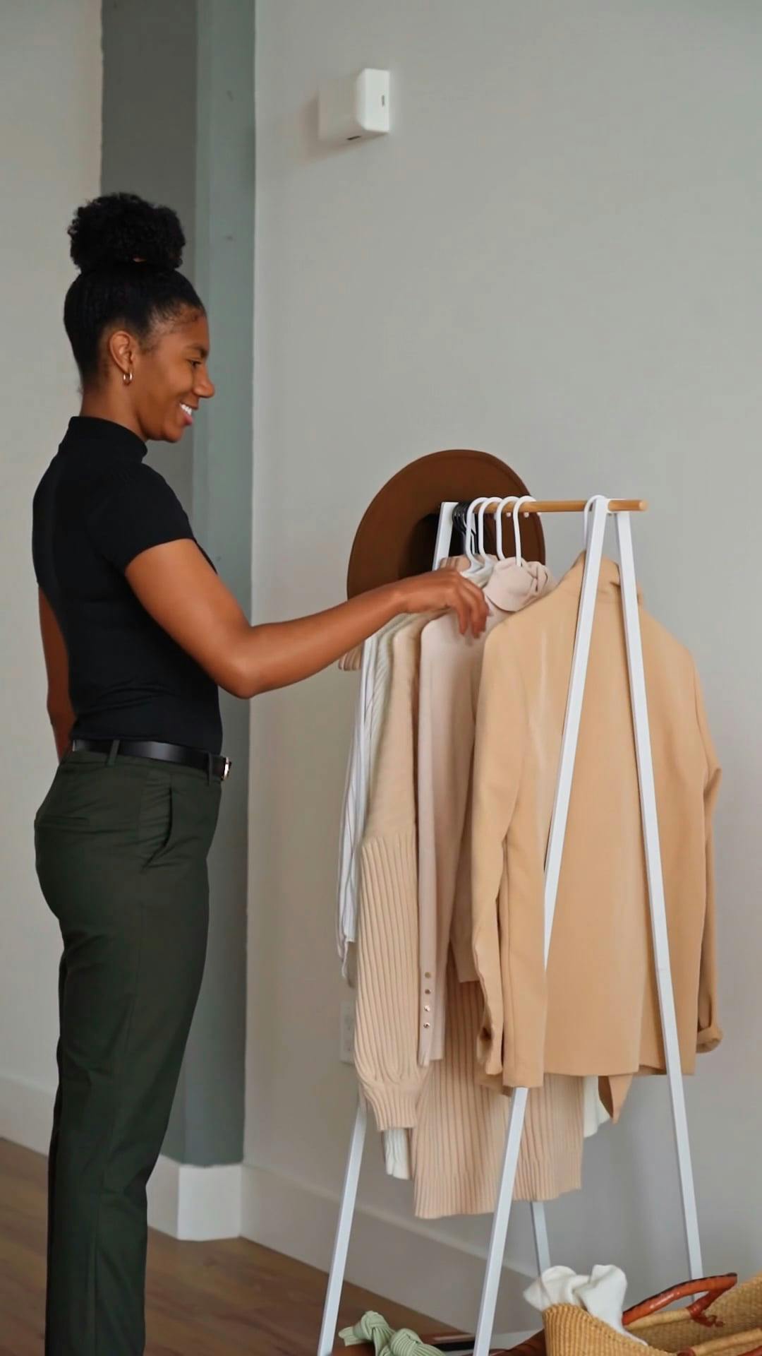 Woman Looking at Clothes in a Clothing Rack · Free Stock Video