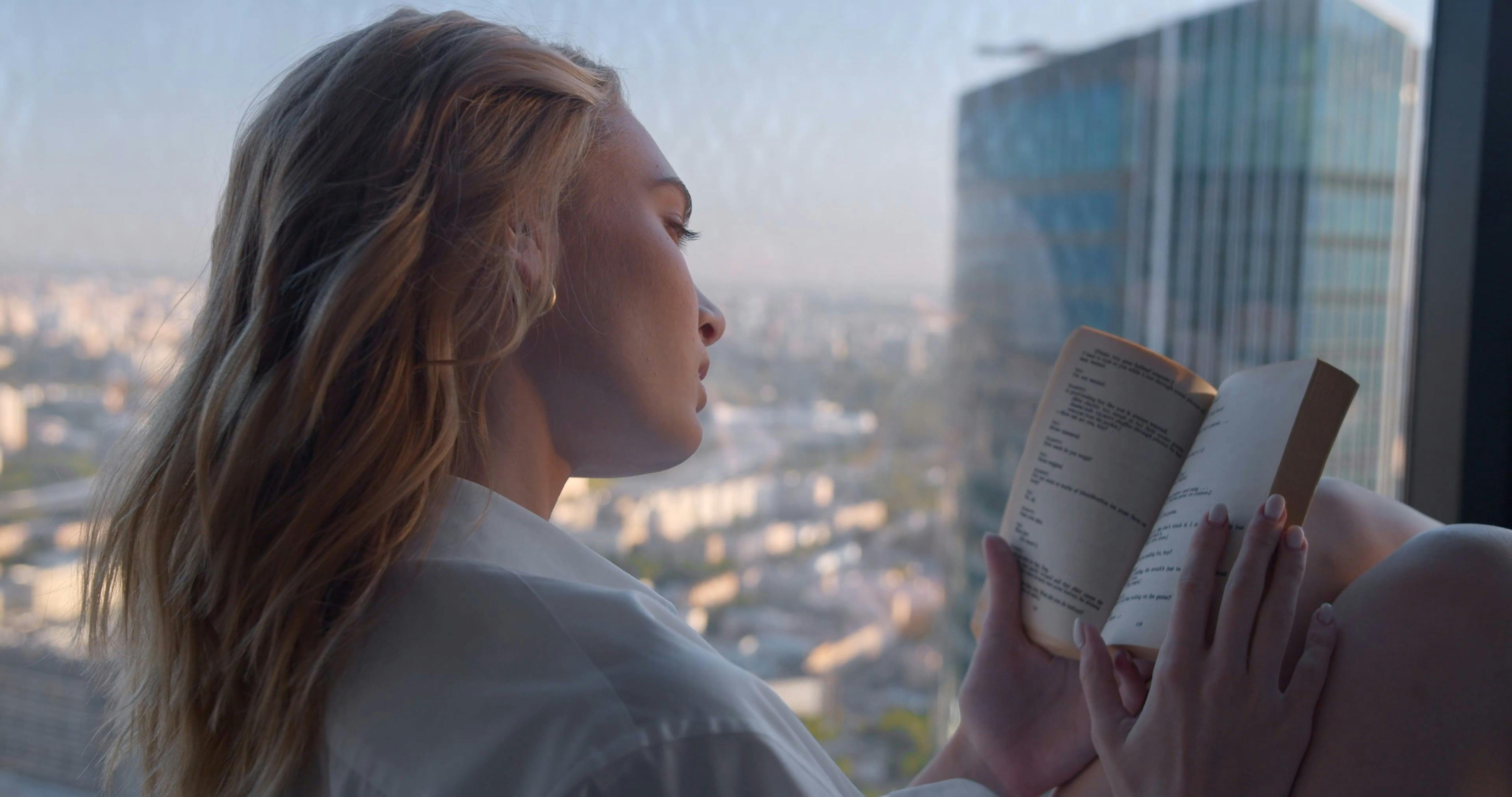 Woman Eating while Reading a Book Free Stock Video Footage, Royalty ...