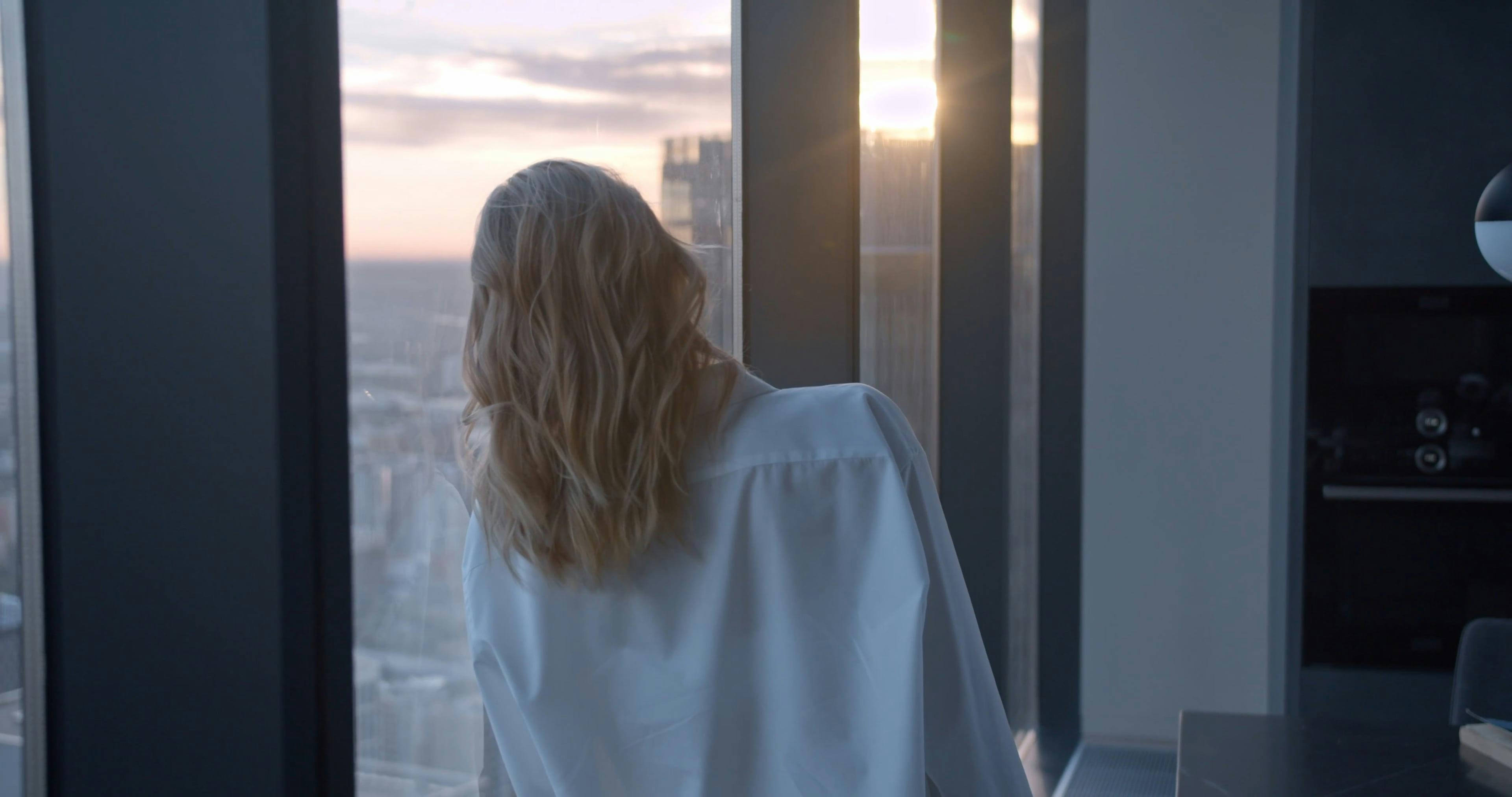 Woman Leaning Against a Window Glass Free Stock Video Footage, Royalty ...