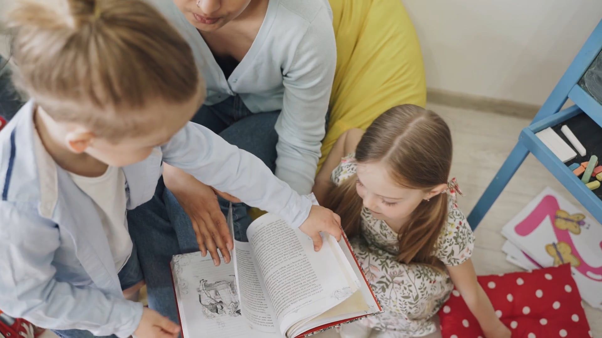 A Teacher Showing a Book to Her Students Free Stock Video Footage ...