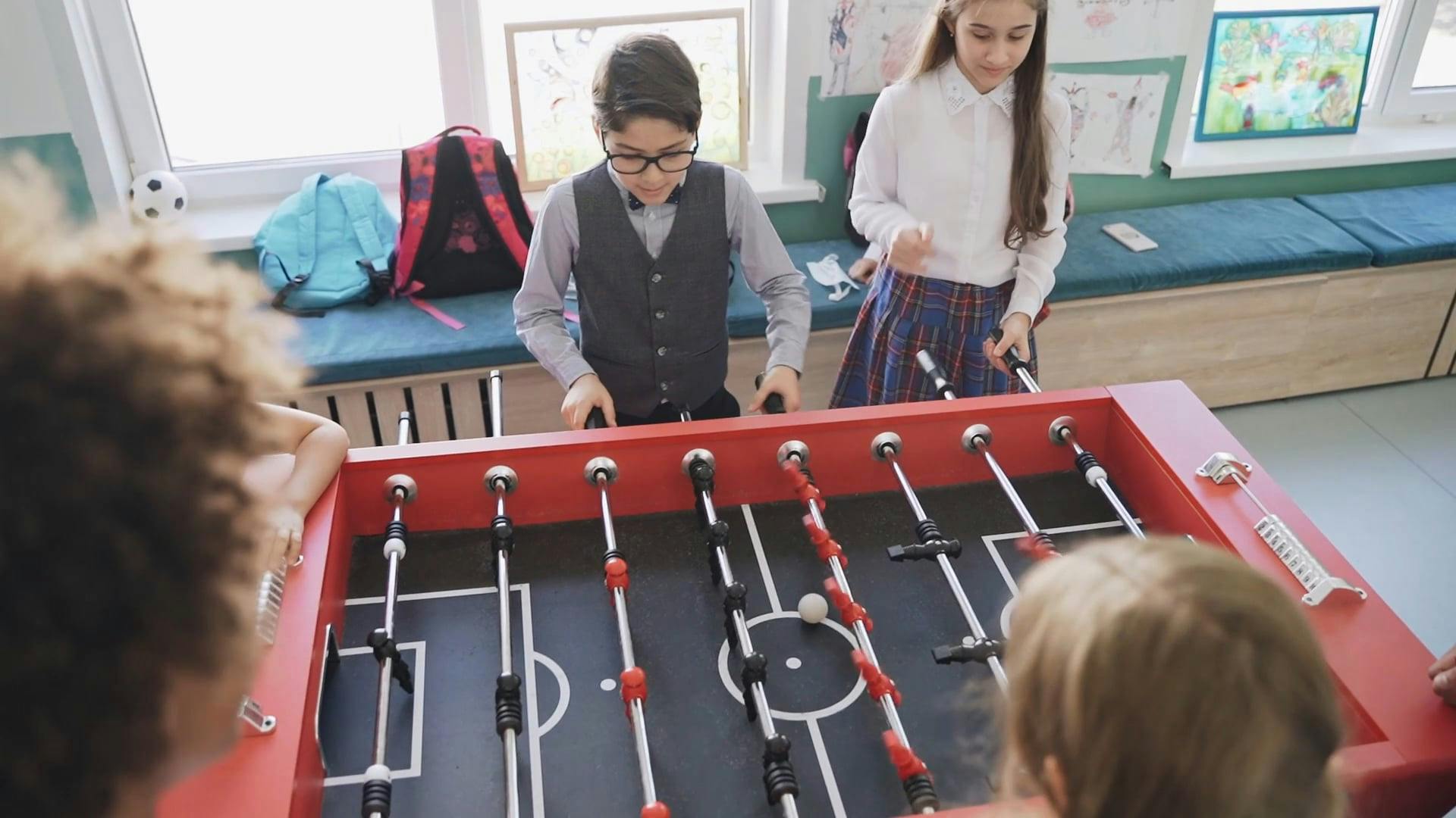 Children Playing Foosball · Free Stock Video