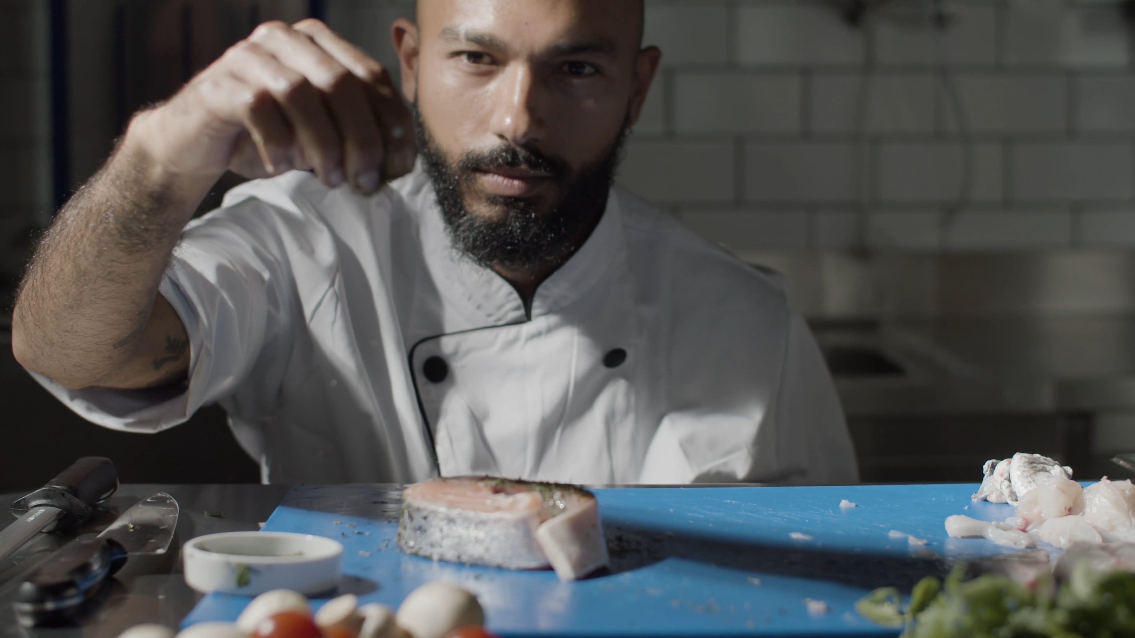 A Chef Adding Condiments on the Top of a Fresh Fish Free Stock Video ...