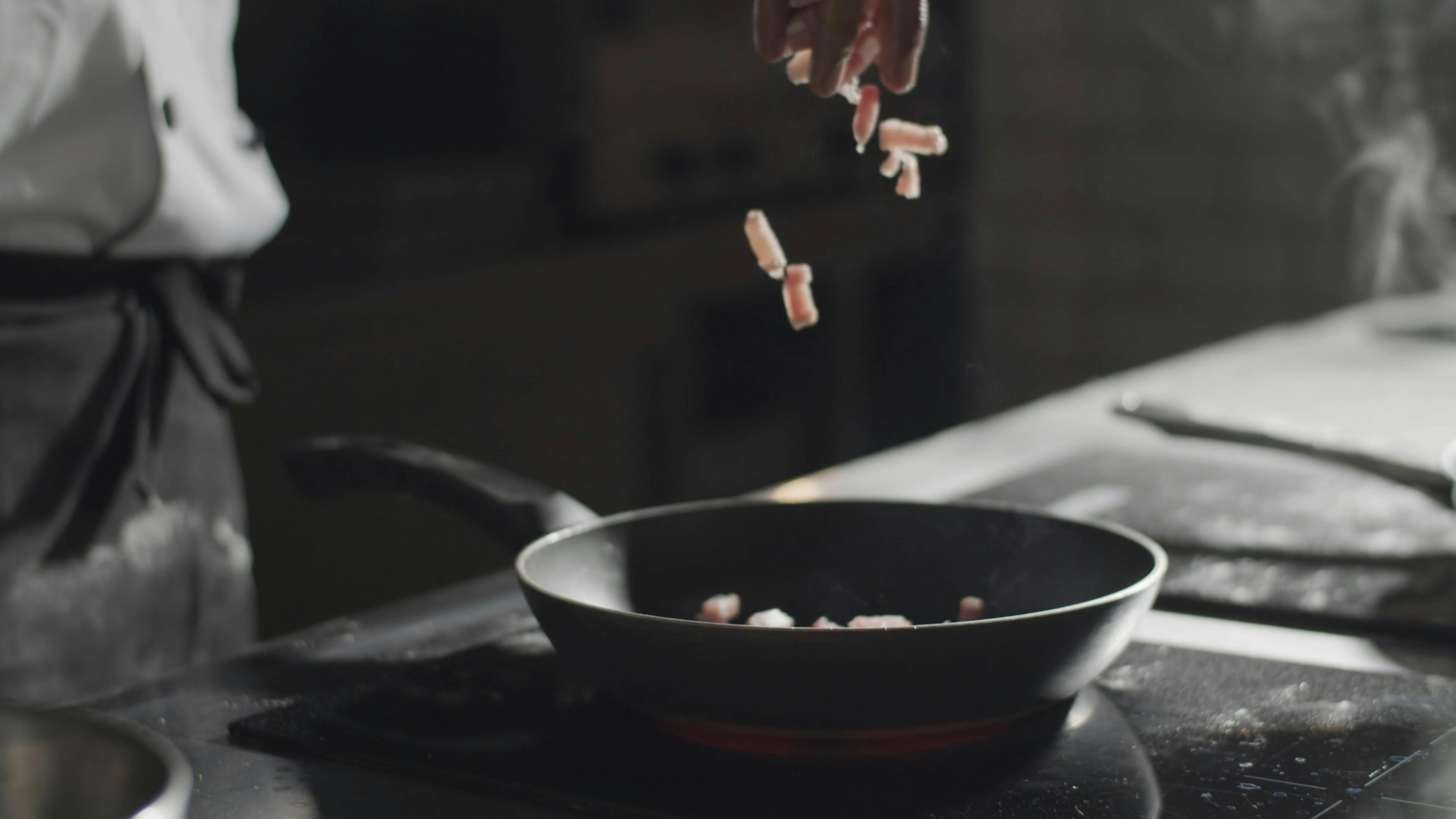 Chef Putting Meat in a Pan · Free Stock Video