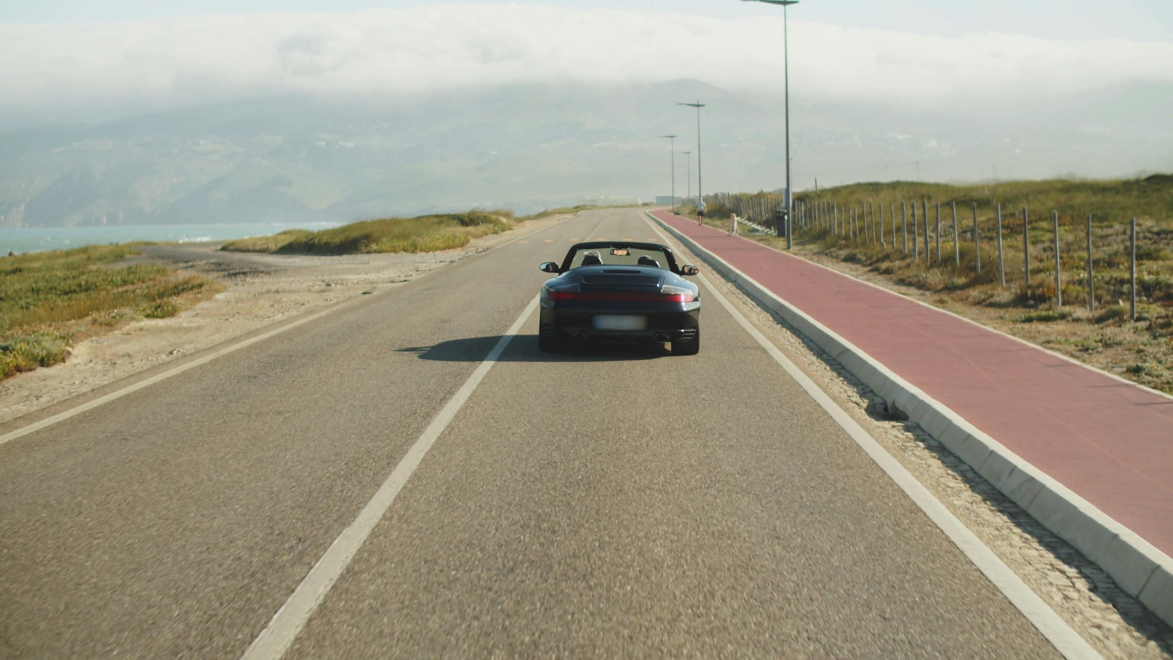 A Luxury car Moving on the Road · Free Stock Video