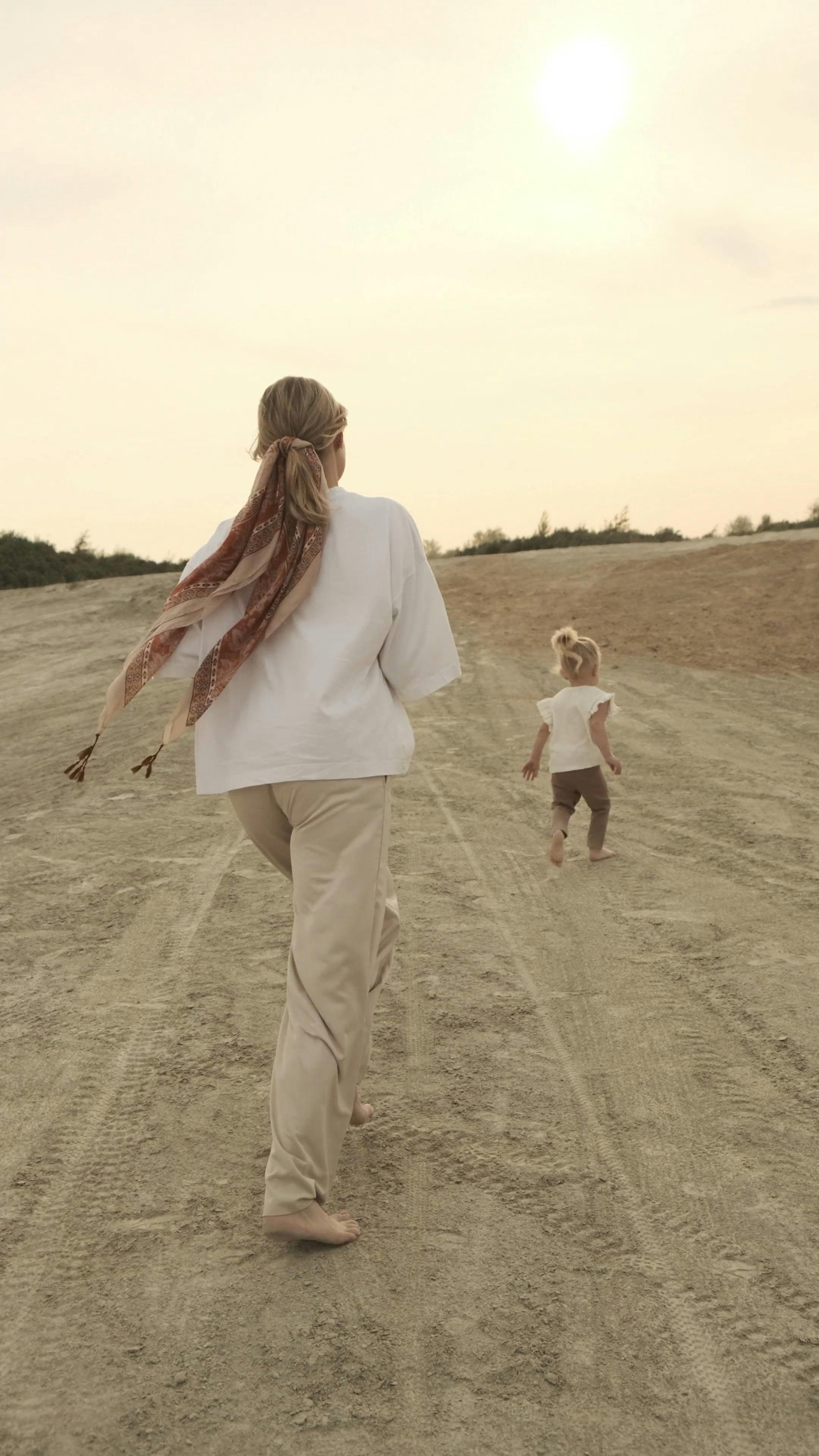 A Mother Chasing and Carrying Her Child Free Stock Video Footage ...