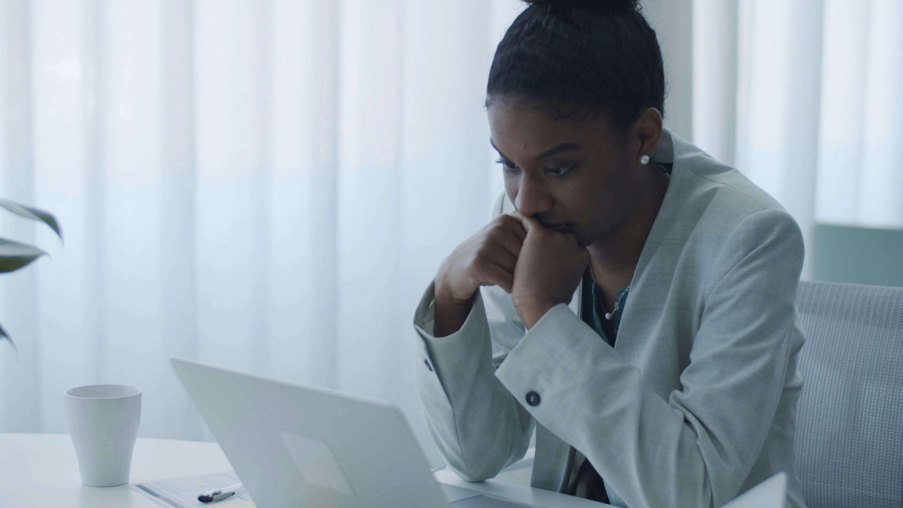 Woman Looking at the Screen of a Laptop Free Stock Video Footage ...