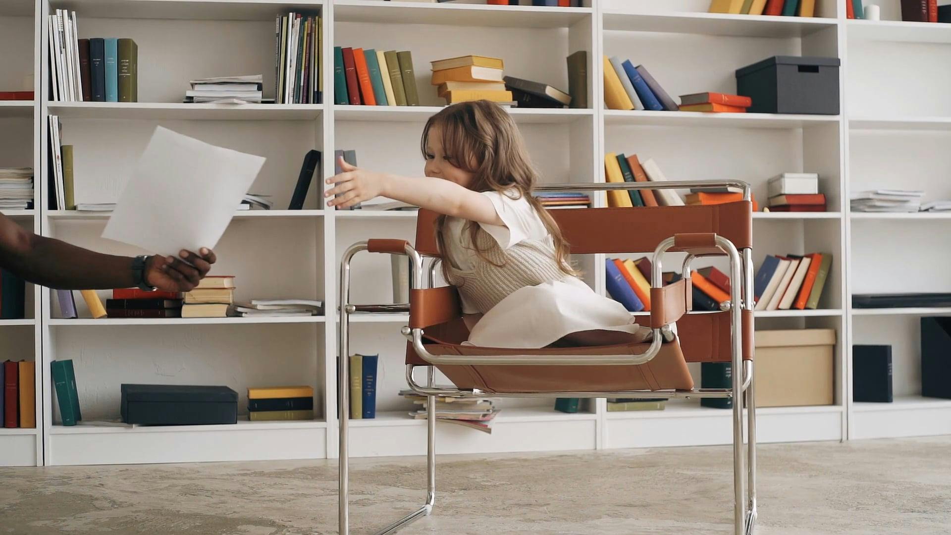 Girl looking a paper · Free Stock Video