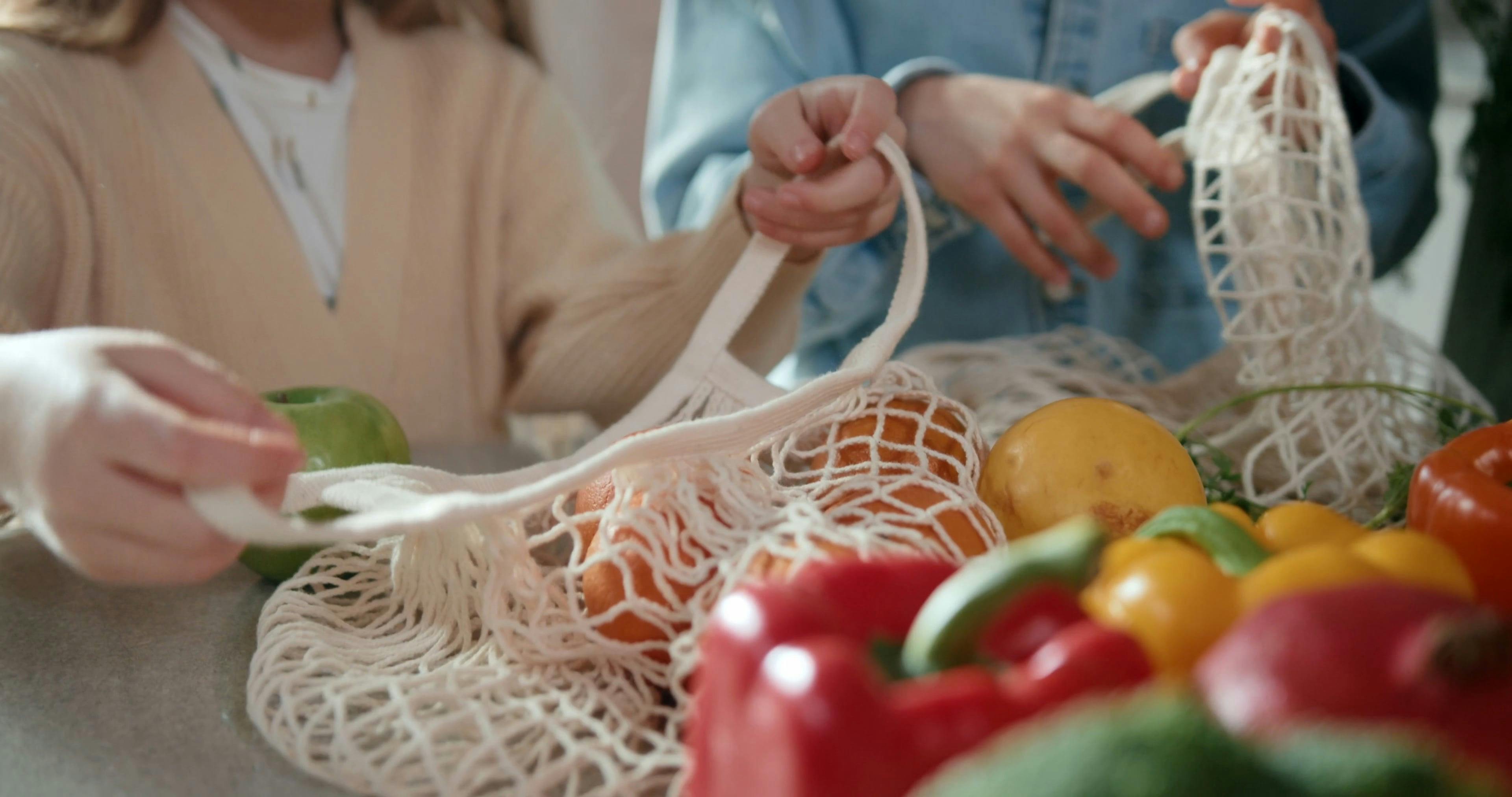 People Getting Fruits on a Net Bag Free Stock Video Footage, Royalty ...