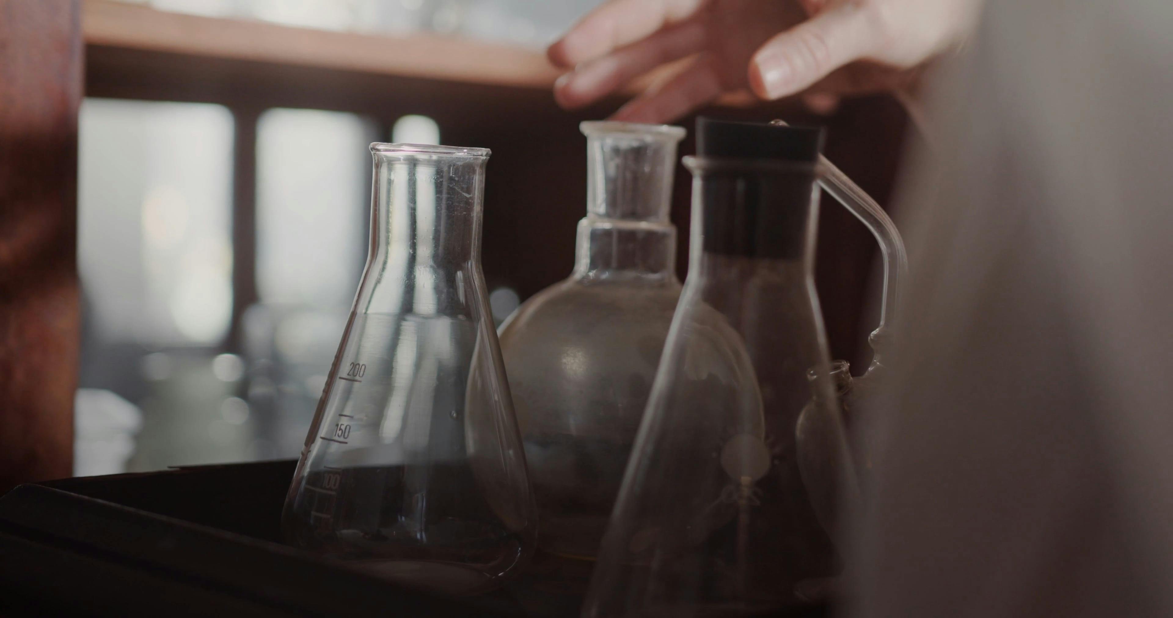 Person Arranging Laboratory Flasks Free Stock Video Footage, Royalty ...