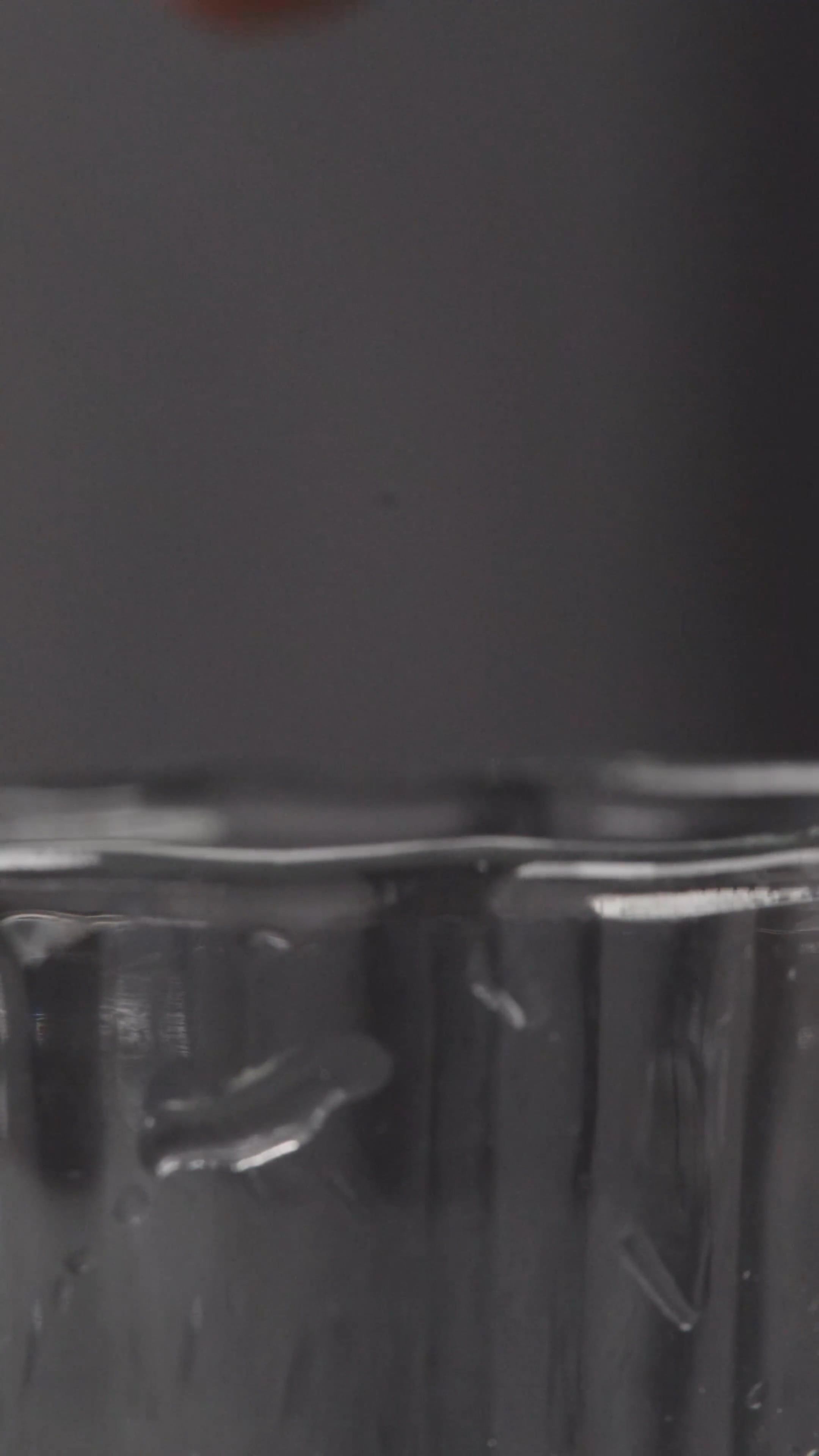 Extreme Close up of Ice Falling into a Glass · Free Stock Video