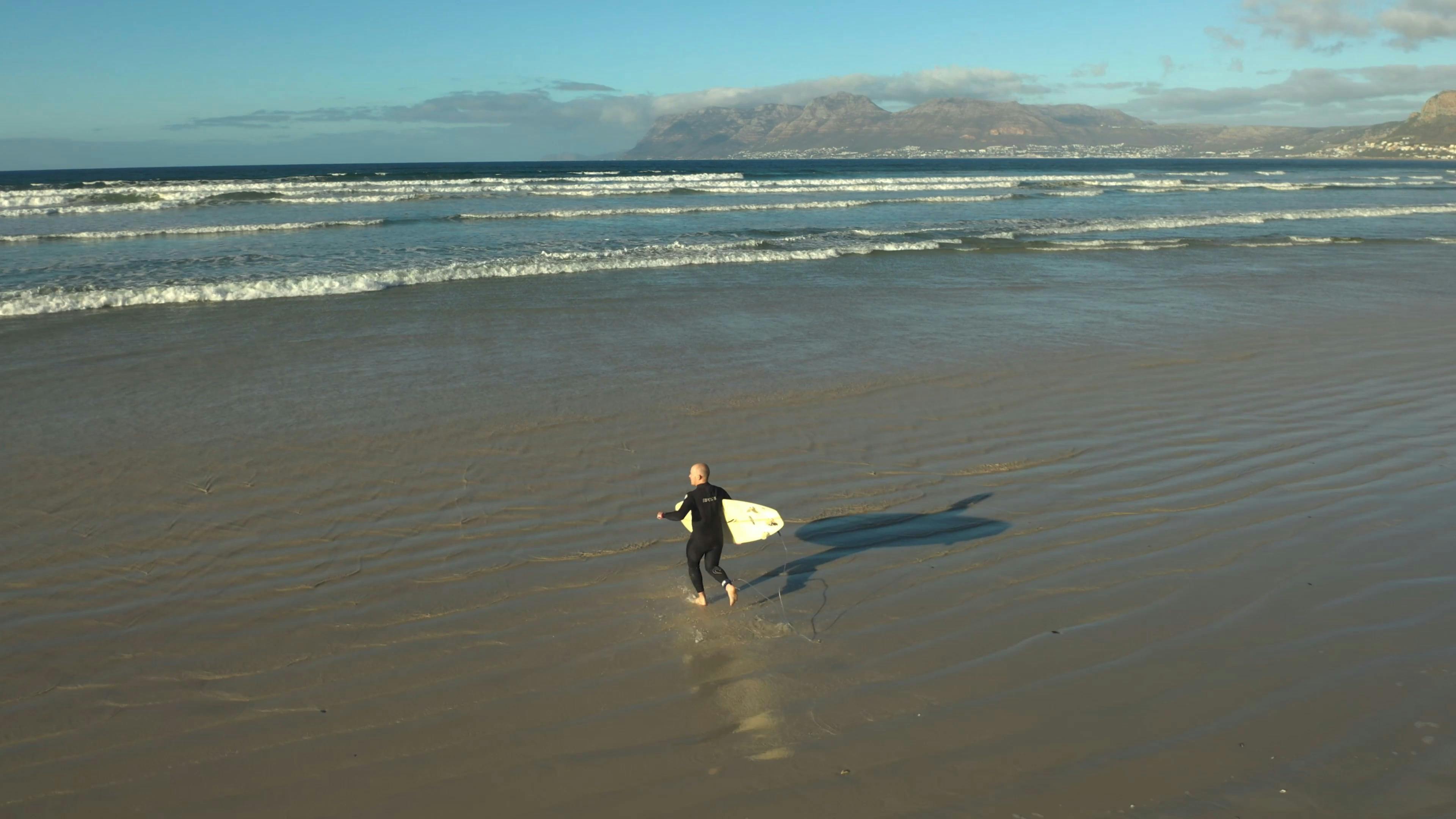 A Surfer Riding The Waves In A Beach Free Stock Video Footage, Royalty ...