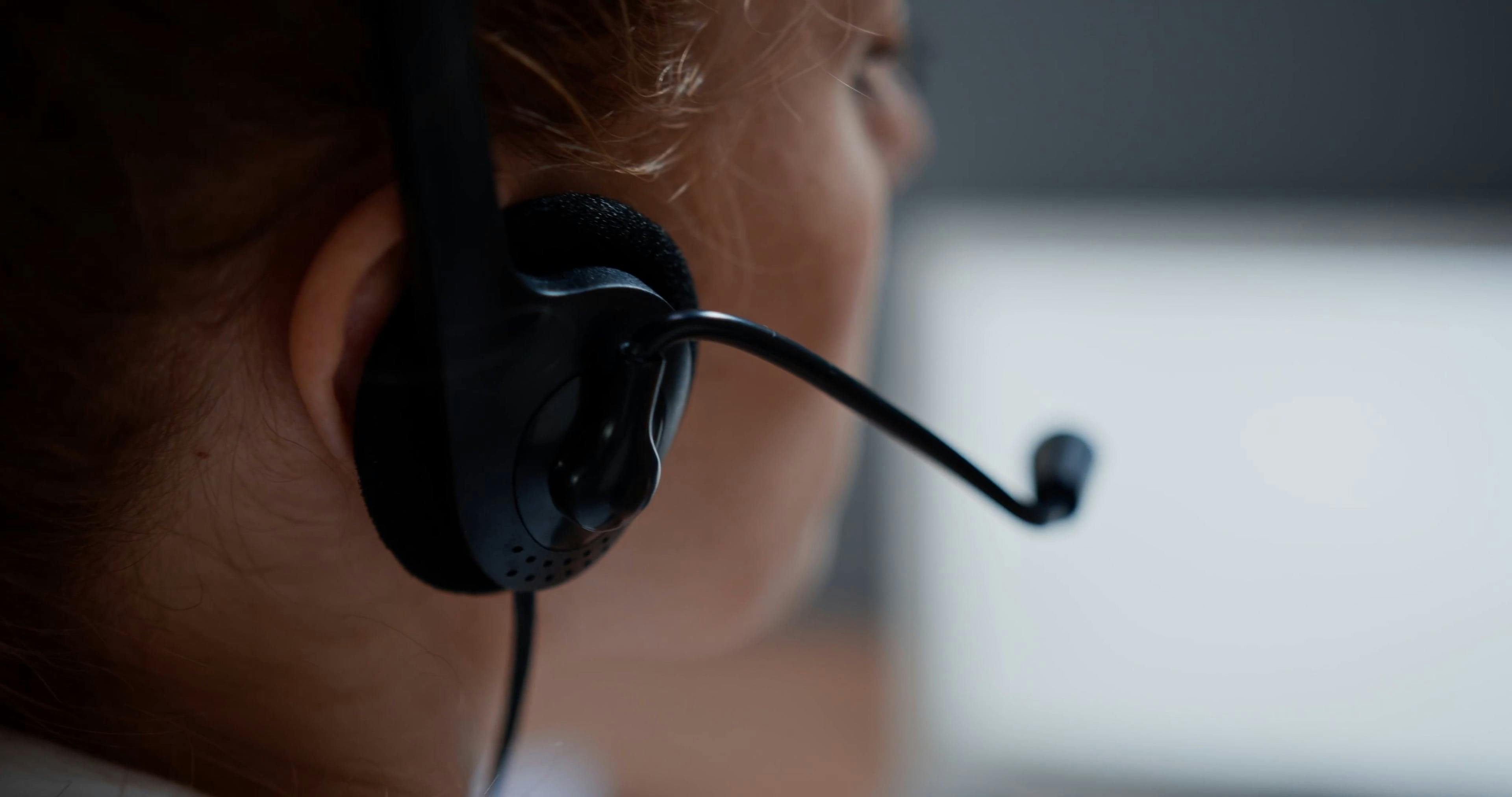 Woman Talking while Using Her Headphones · Free Stock Video