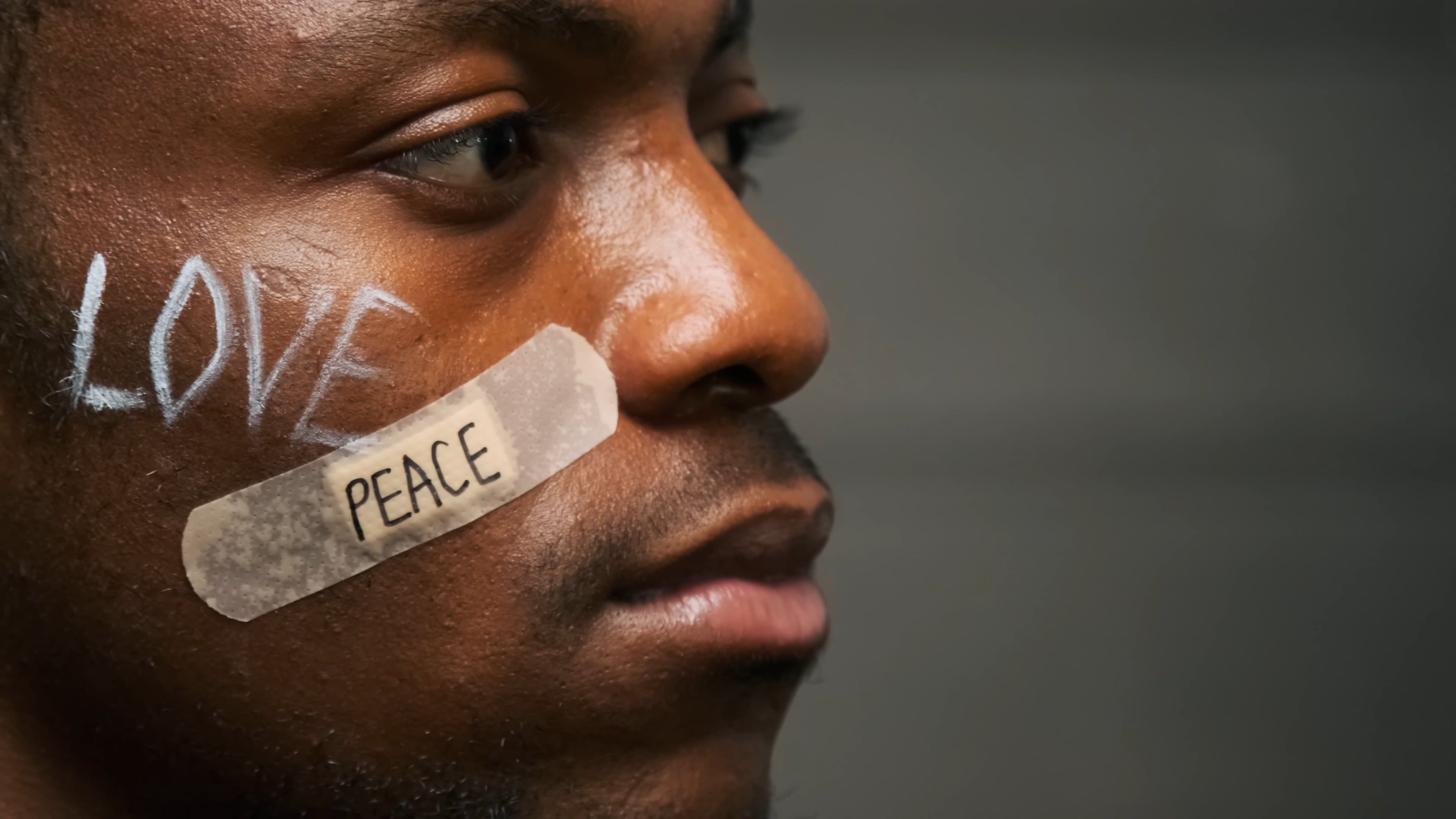 A Close-up Video of a Man with Band Aid on His Face Free Stock Video ...