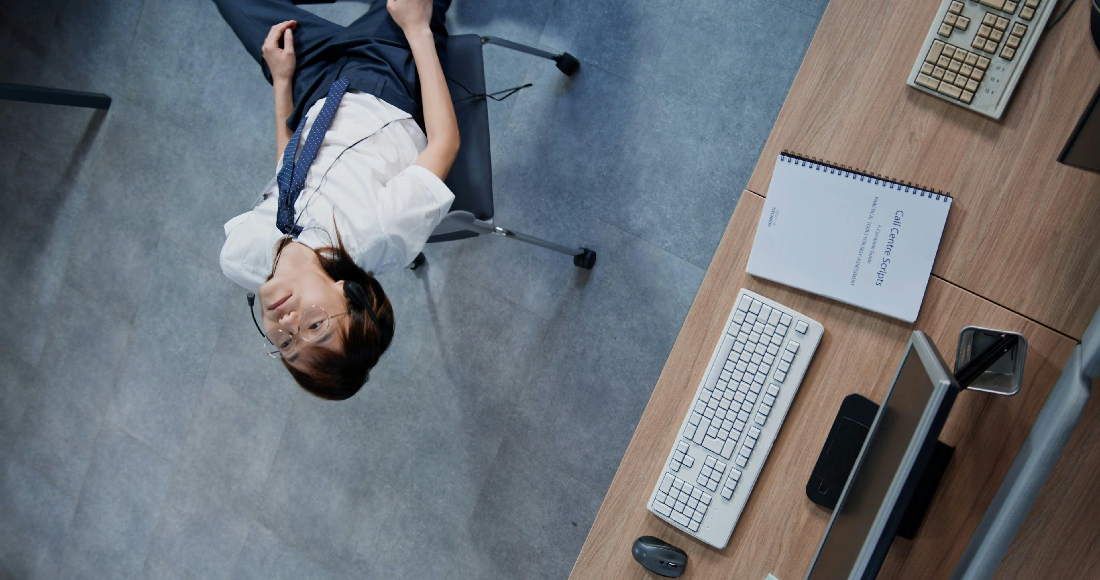 Male Call Center Agent Reading Information to His Customer · Free Stock ...