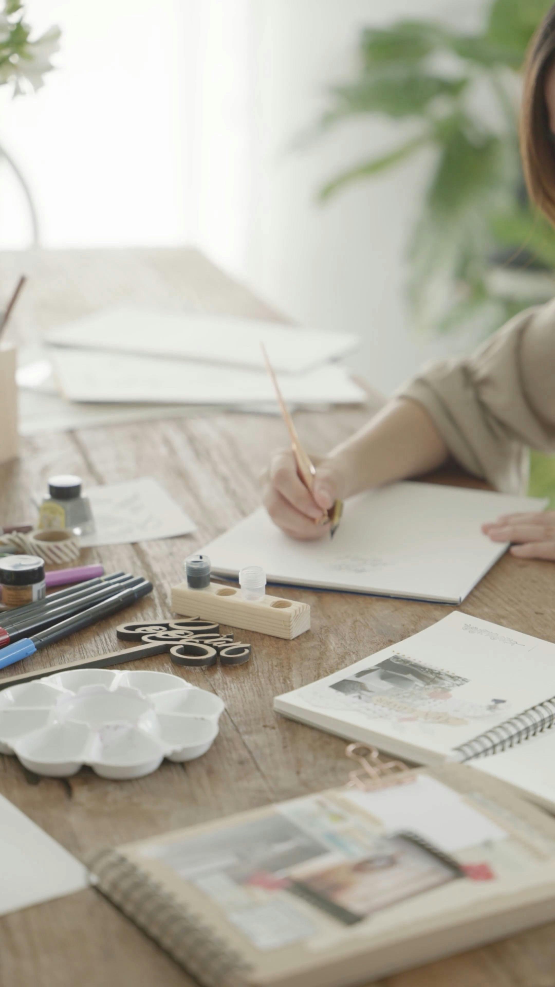 A Woman Doing Calligraphy on a Bond Paper Free Stock Video Footage ...