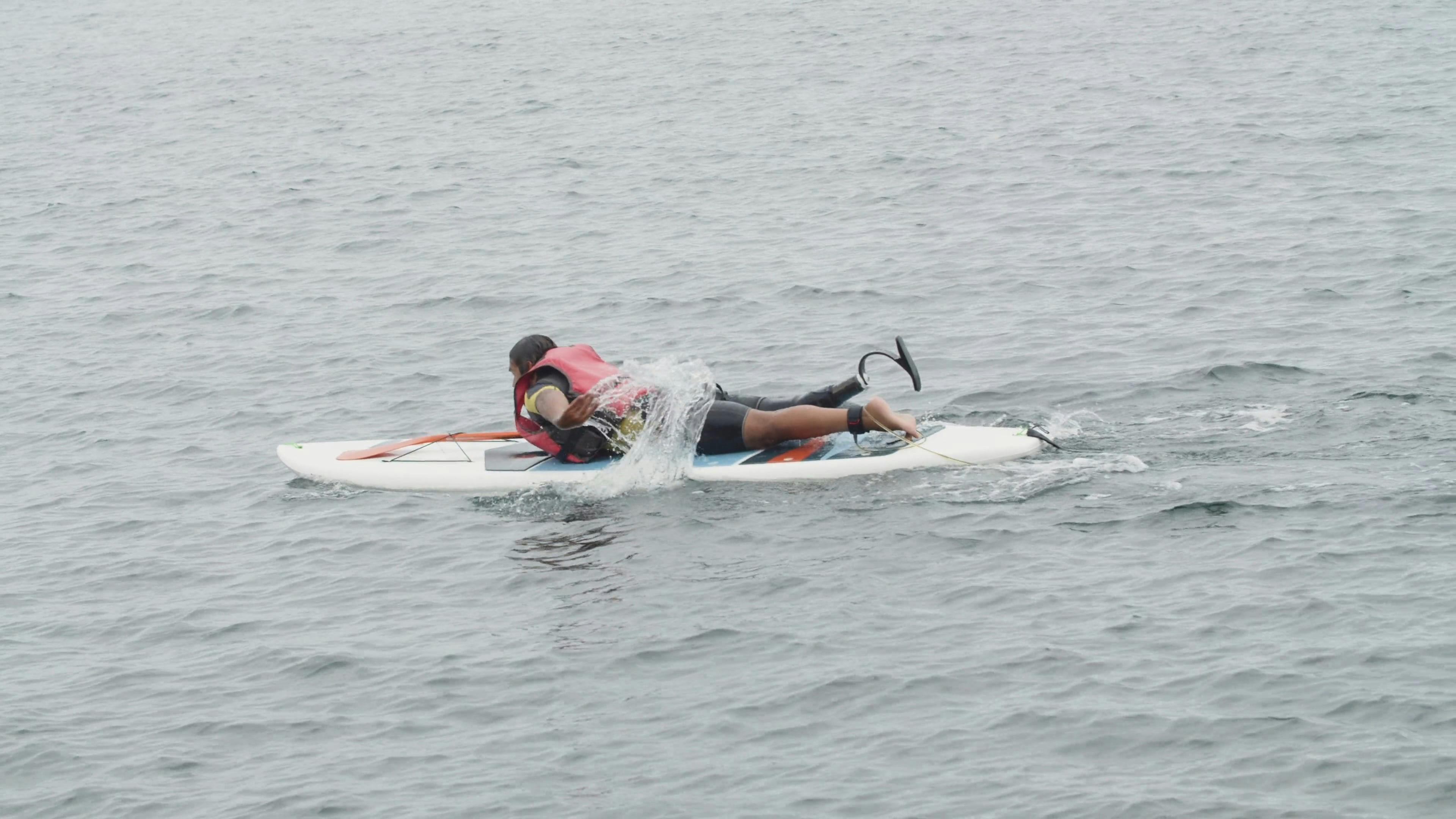 A Man Paddling while on the Sup Board · Free Stock Video