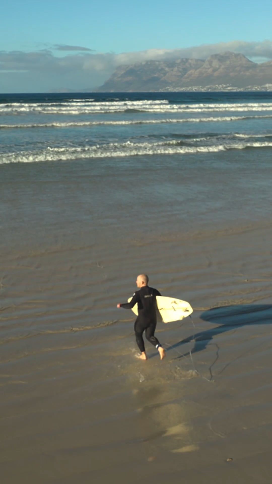 A Man Running while Approaching the Beach Waves Free Stock Video ...