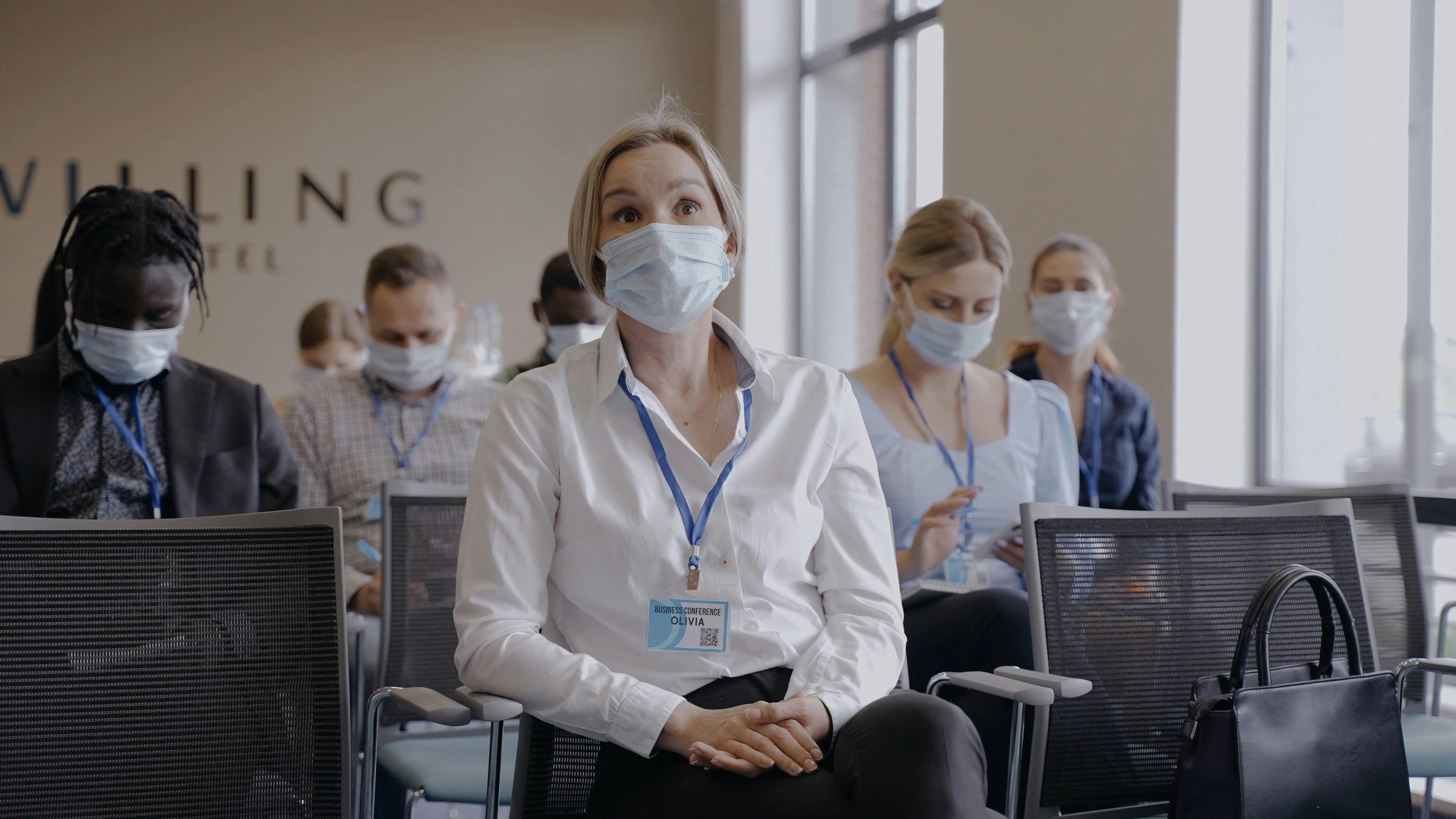 Business People Wearing Face Masks while on a Conference · Free Stock Video