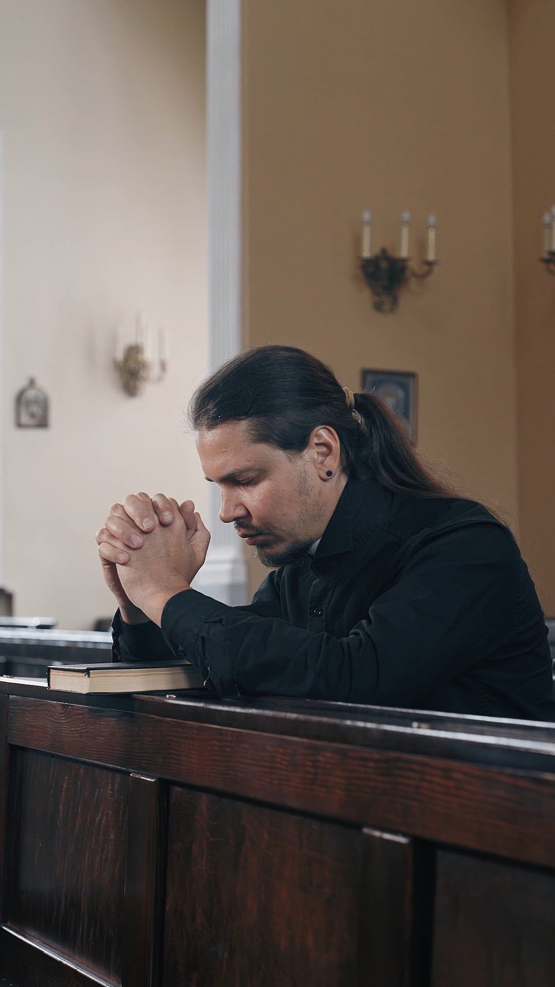 A Man Praying While Kneeling Down · Free Stock Video