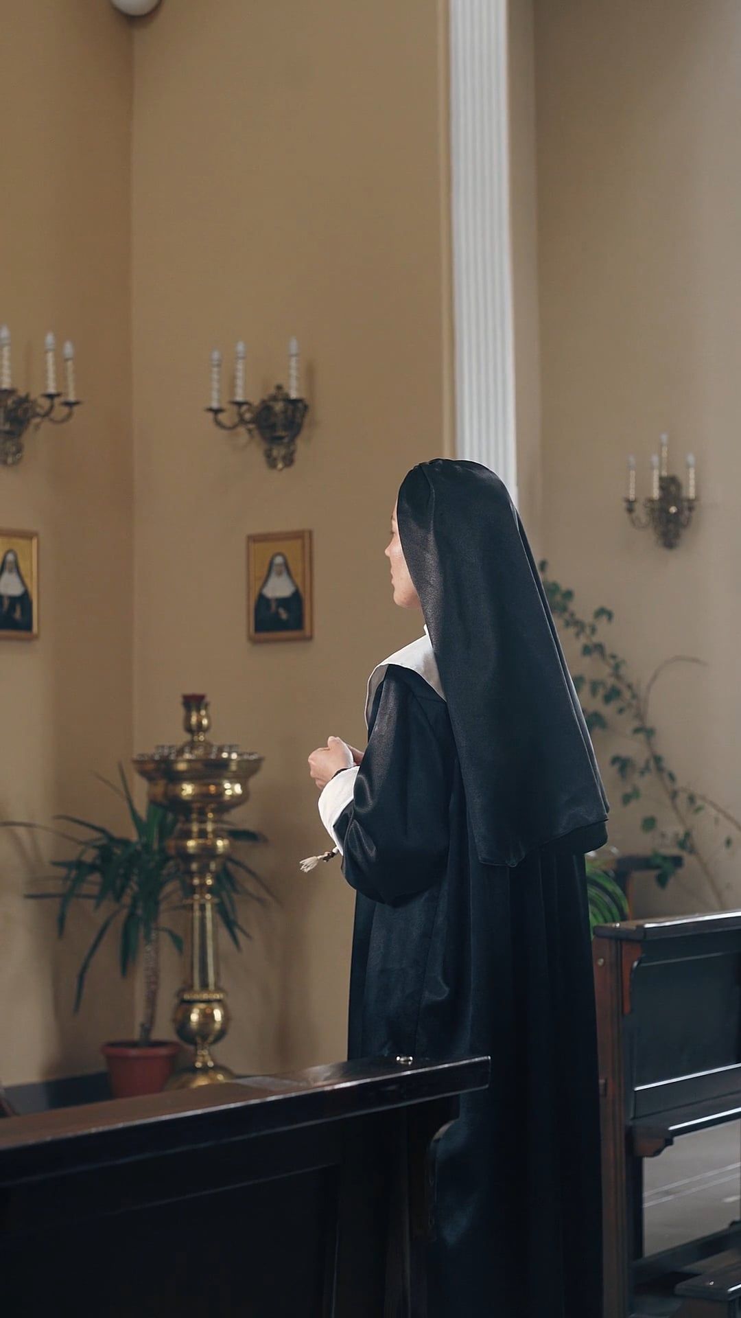 Back View of a Priest Pointing at a Bible on an Altar Free Stock Video ...