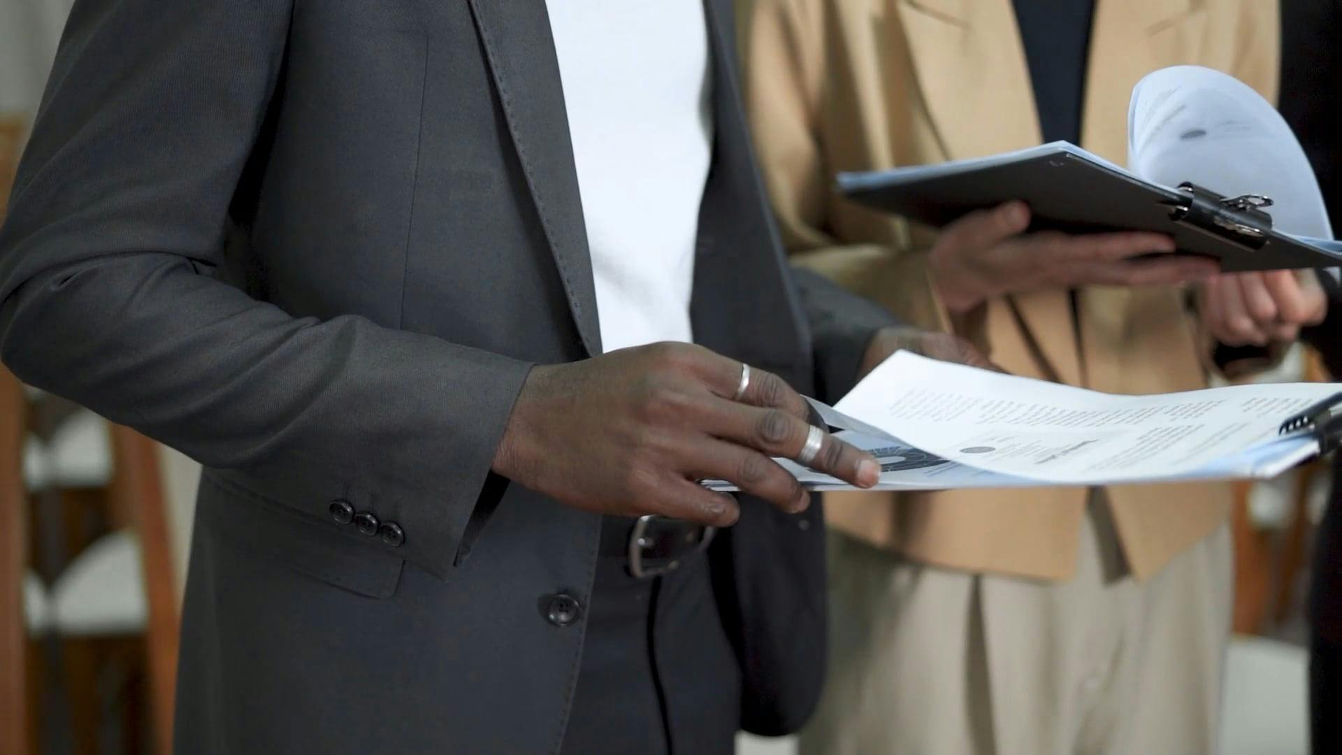 People Holding Document Papers Free Stock Video Footage, Royalty-Free ...