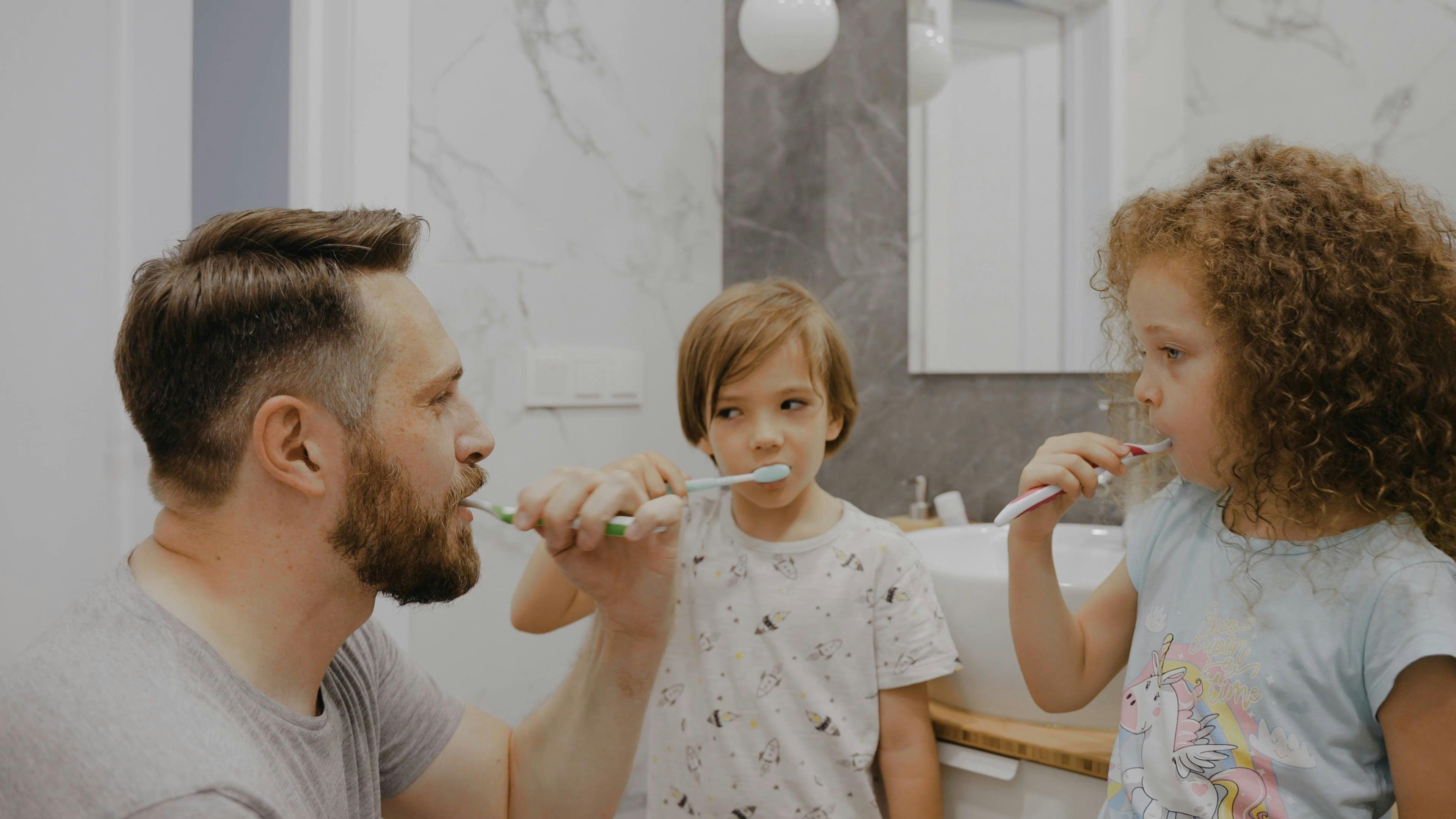 Father and Children Brushing their Teeth Free Stock Video Footage ...
