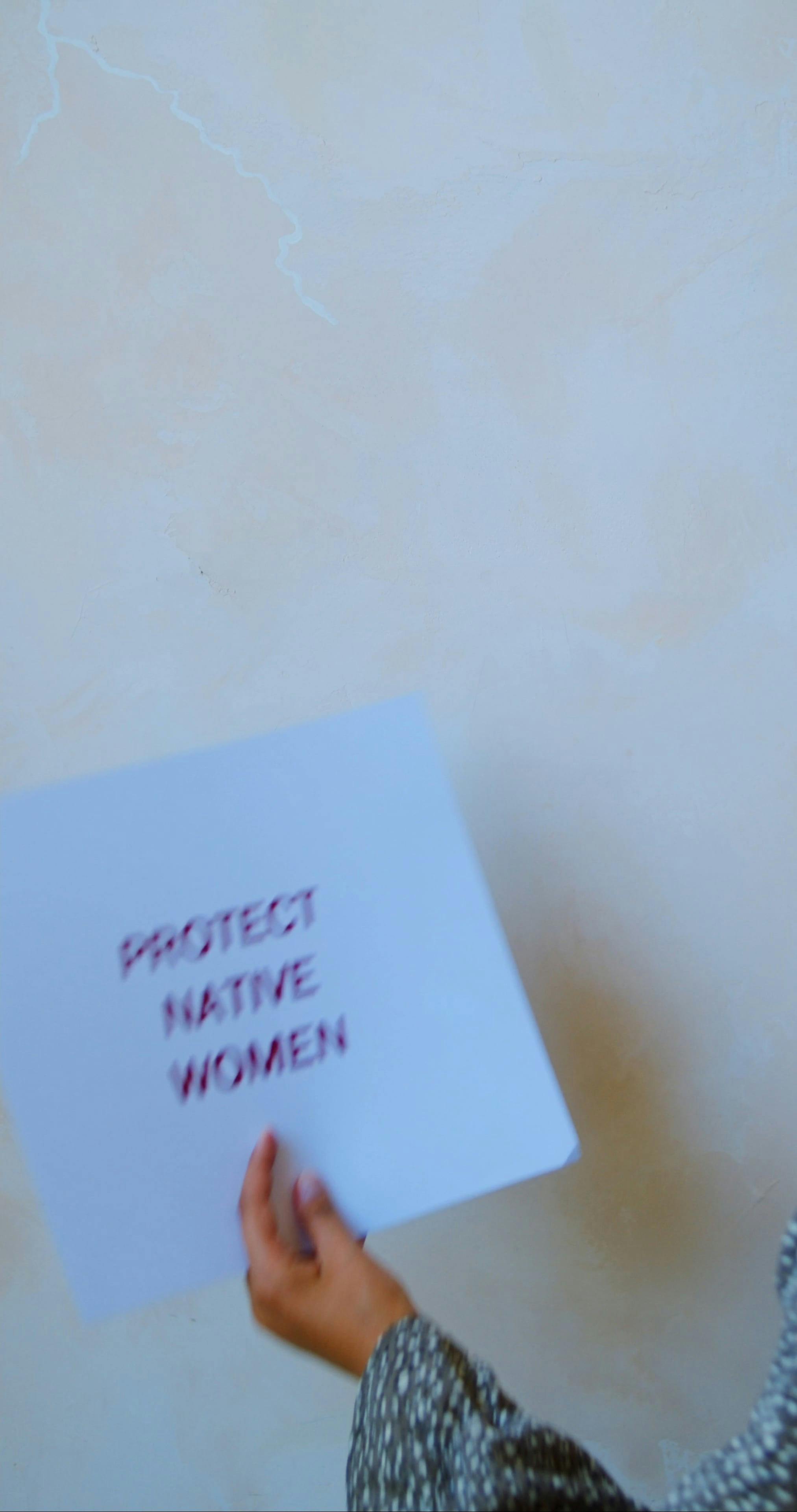 A Person Taping a Paper on a Wall Free Stock Video Footage, Royalty ...