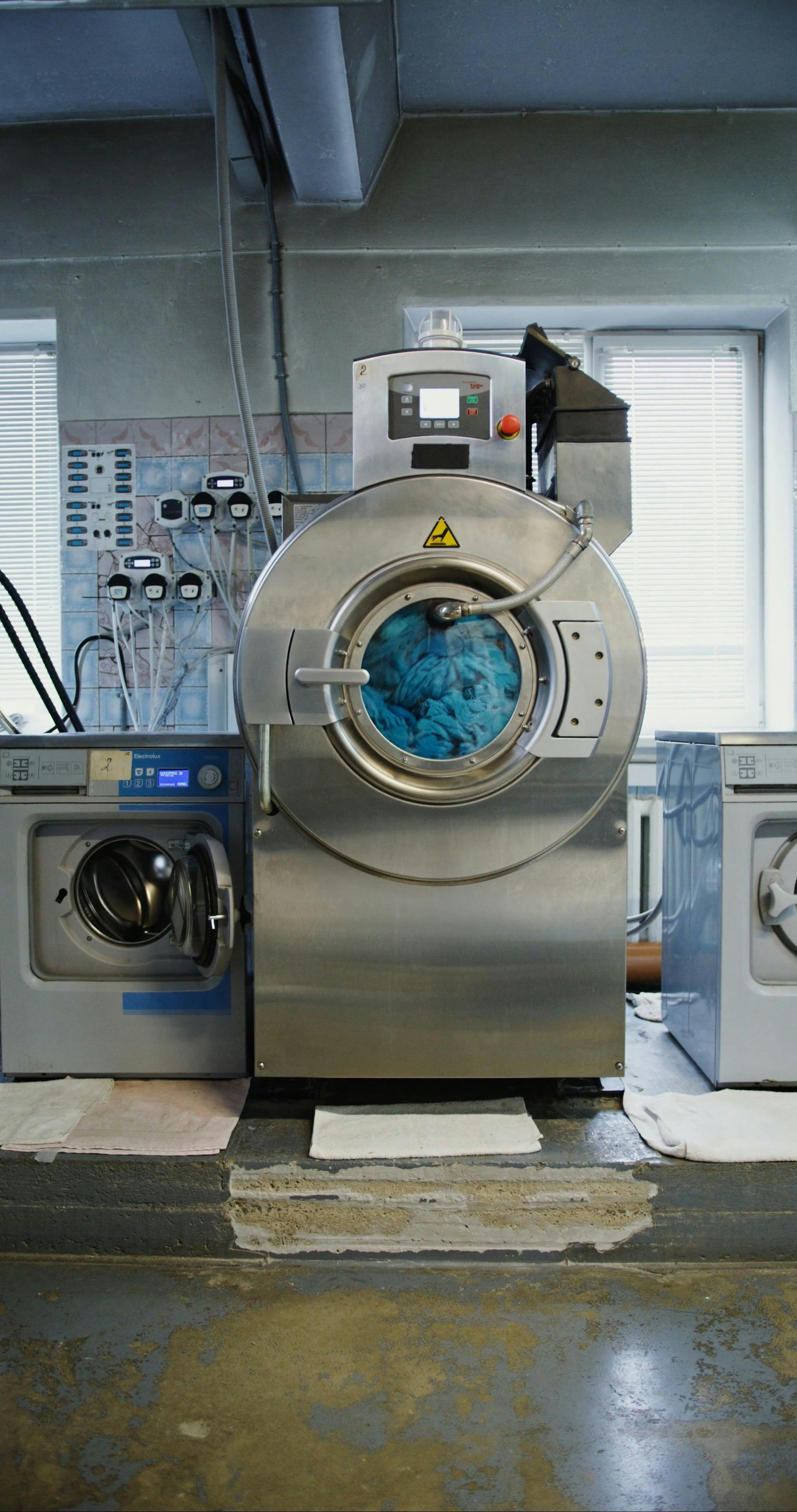 A Woman Walking by Washing Machines Free Stock Video Footage, Royalty ...