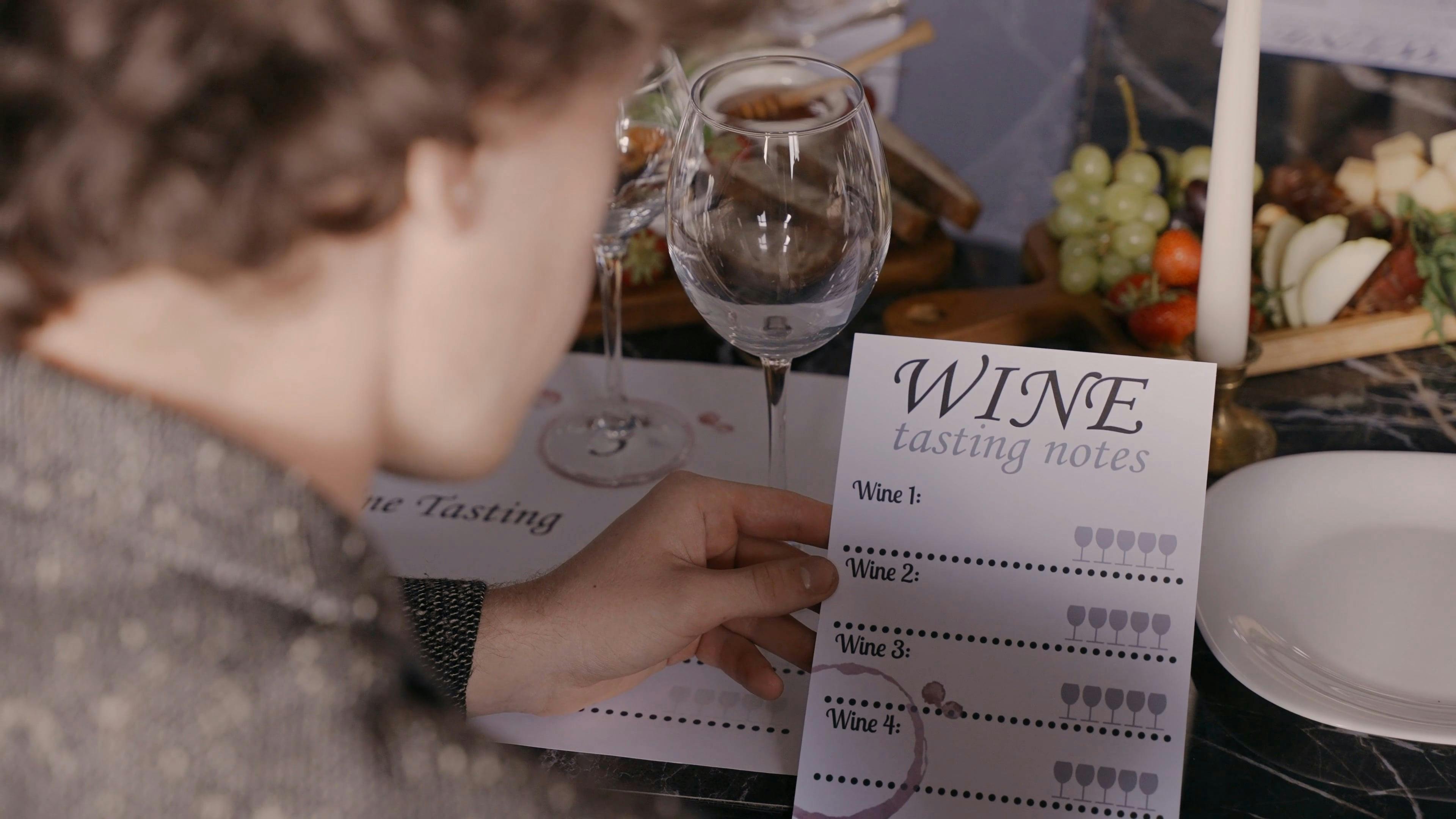 A Person Looking a Wine Tasting Notes · Free Stock Video