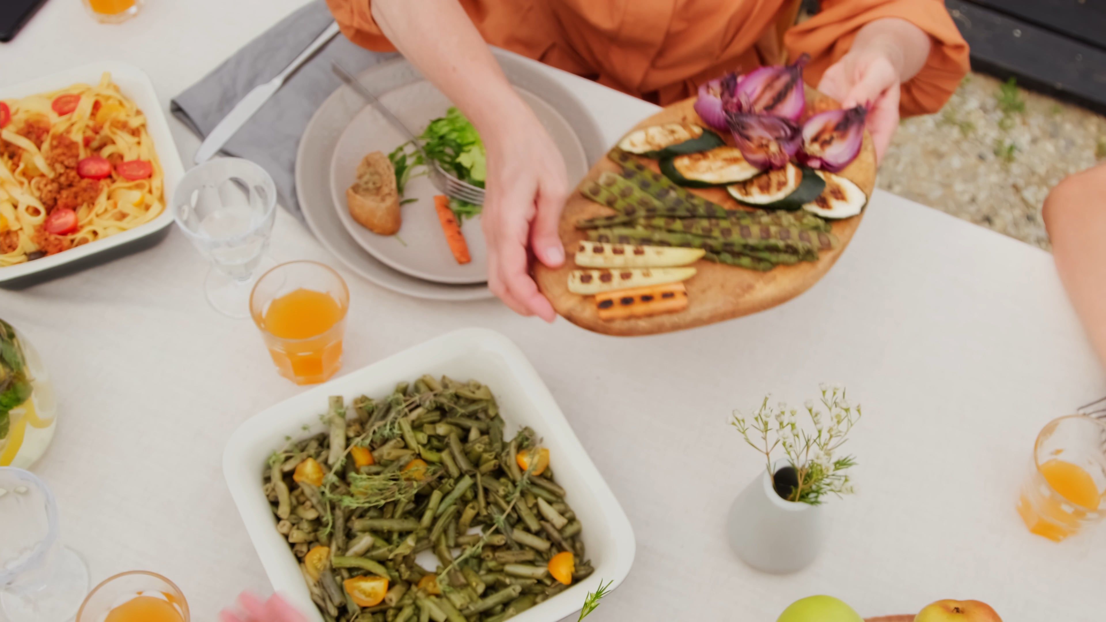 Person Passing a Tray of Grilled Vegetables · Free Stock Video