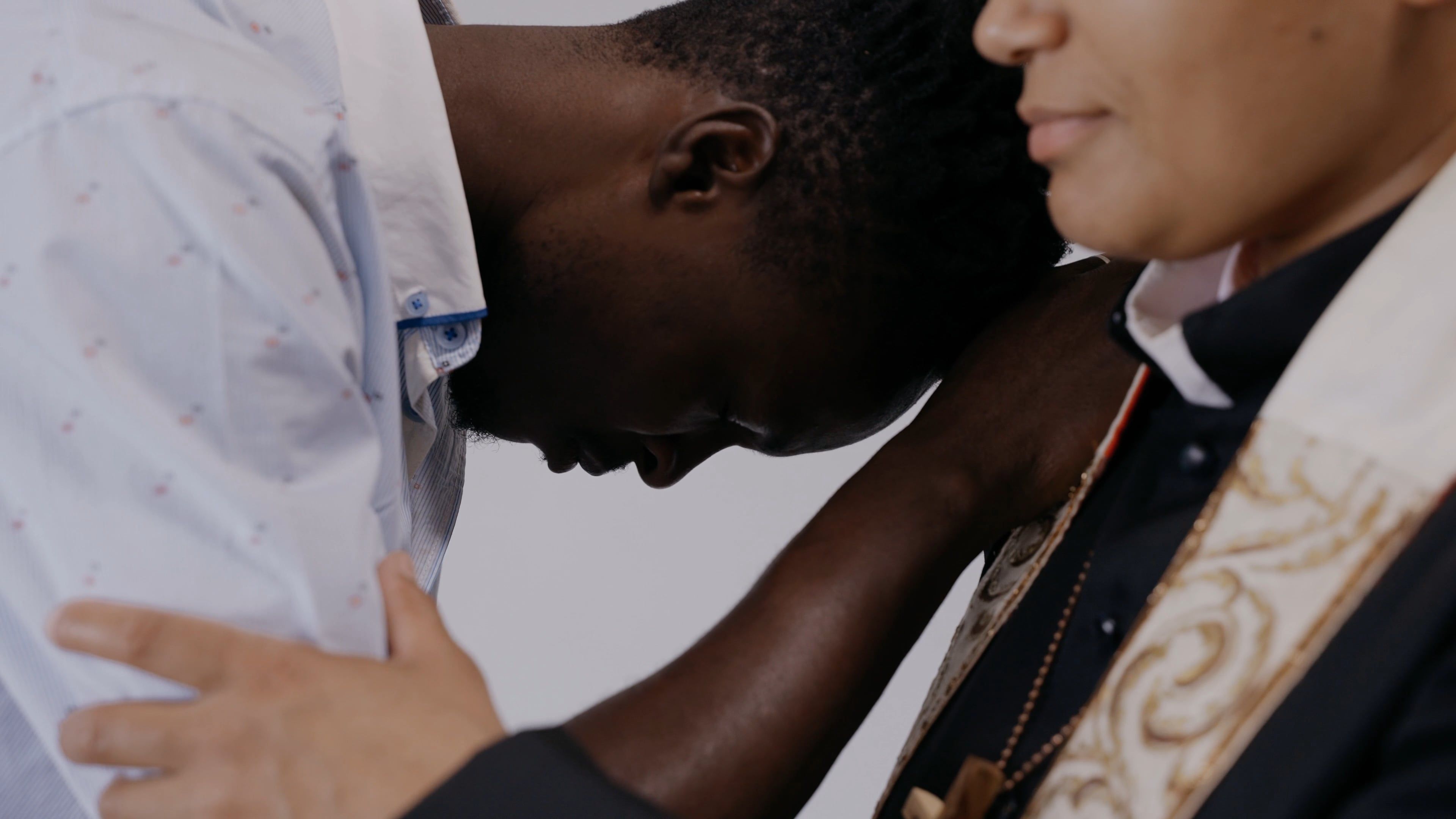 A Pastor Praying Over a Man · Free Stock Video