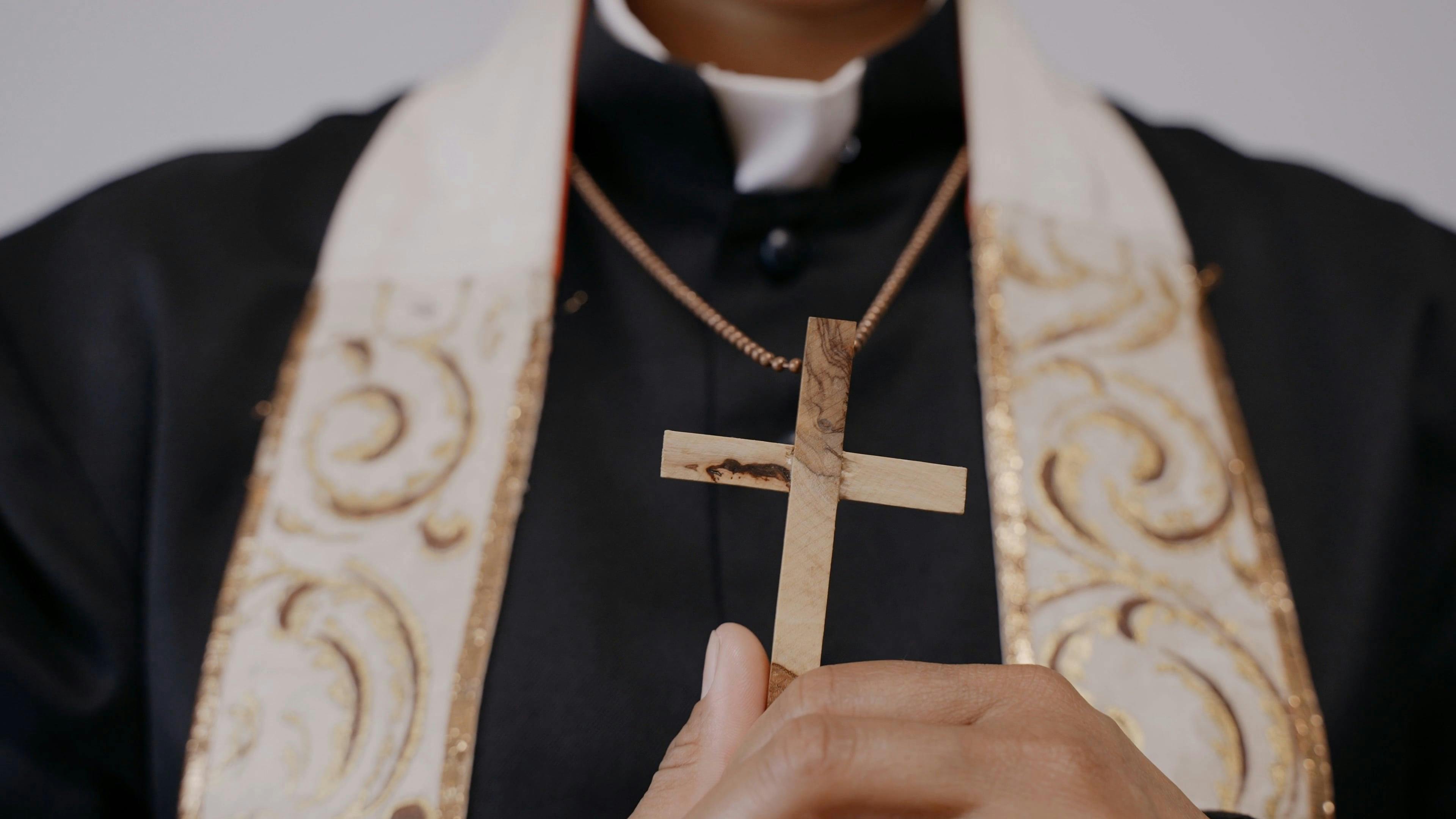 A Pastor Holding a Cross Free Stock Video Footage, Royalty-Free 4K & HD ...