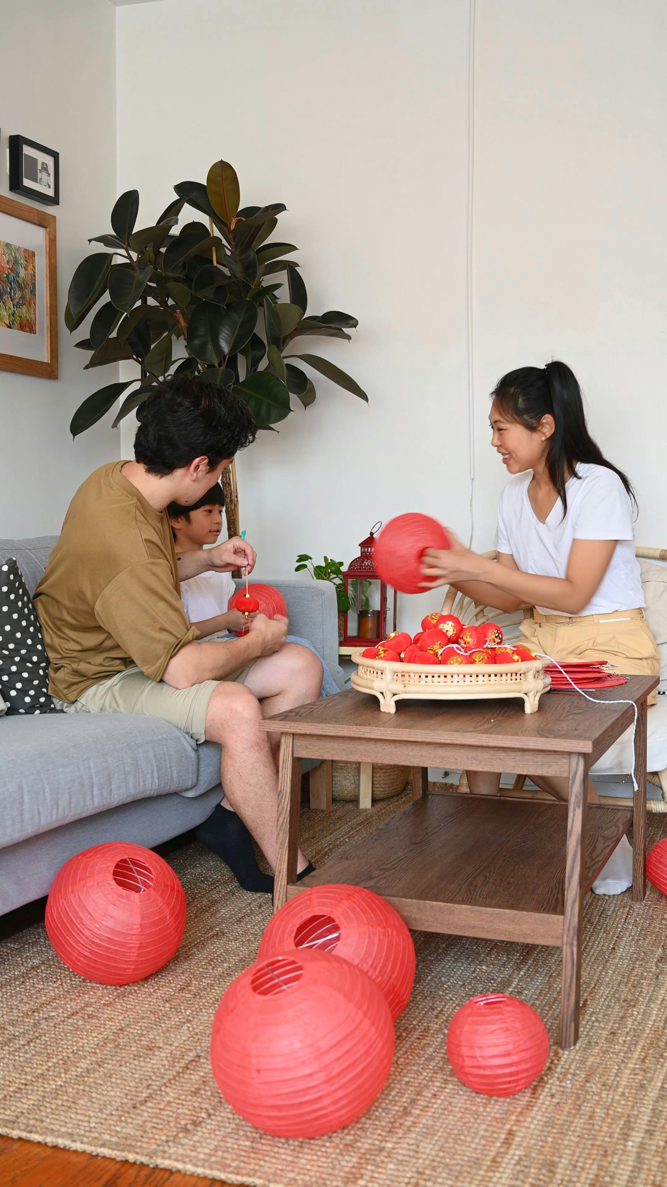 Parents with their Child Fixing Decorations Free Stock Video Footage ...