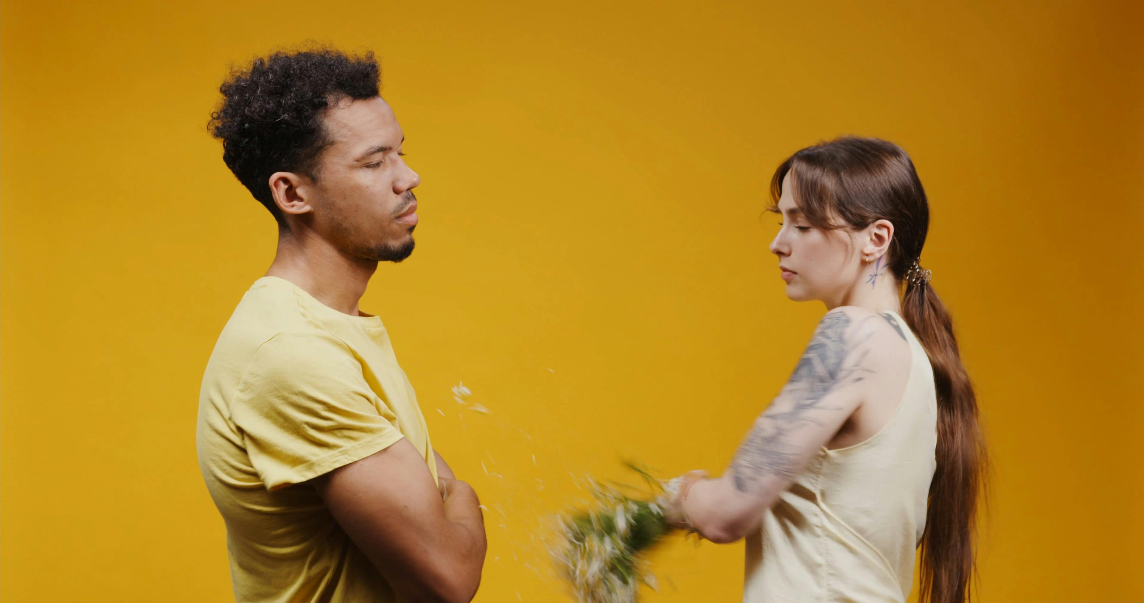 Angry Woman Hitting a Man with Flowers Free Stock Video Footage ...