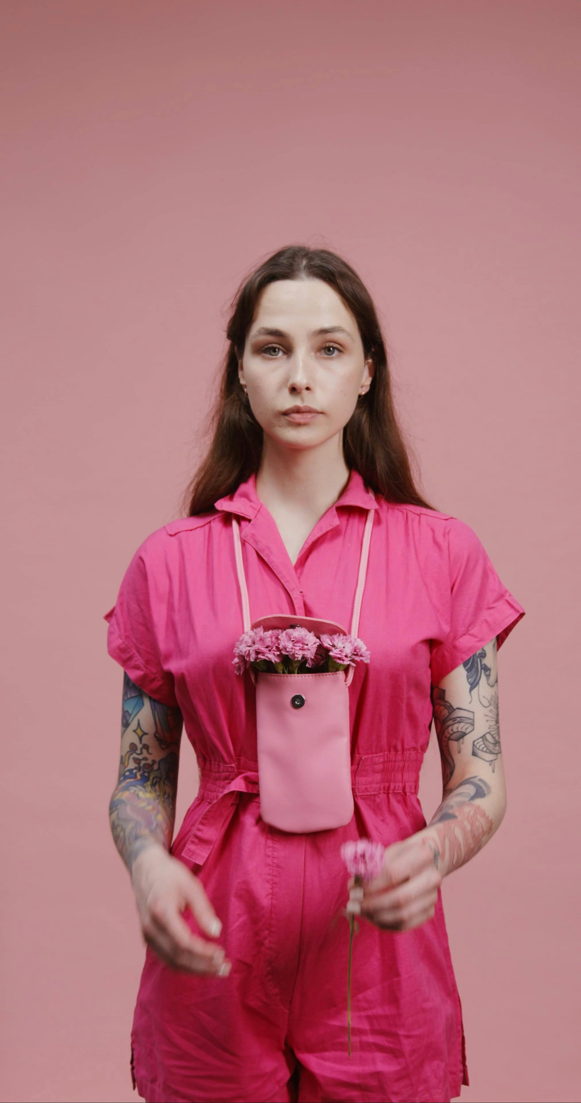 A Woman Wearing Pink Looking at Camera Free Stock Video Footage ...