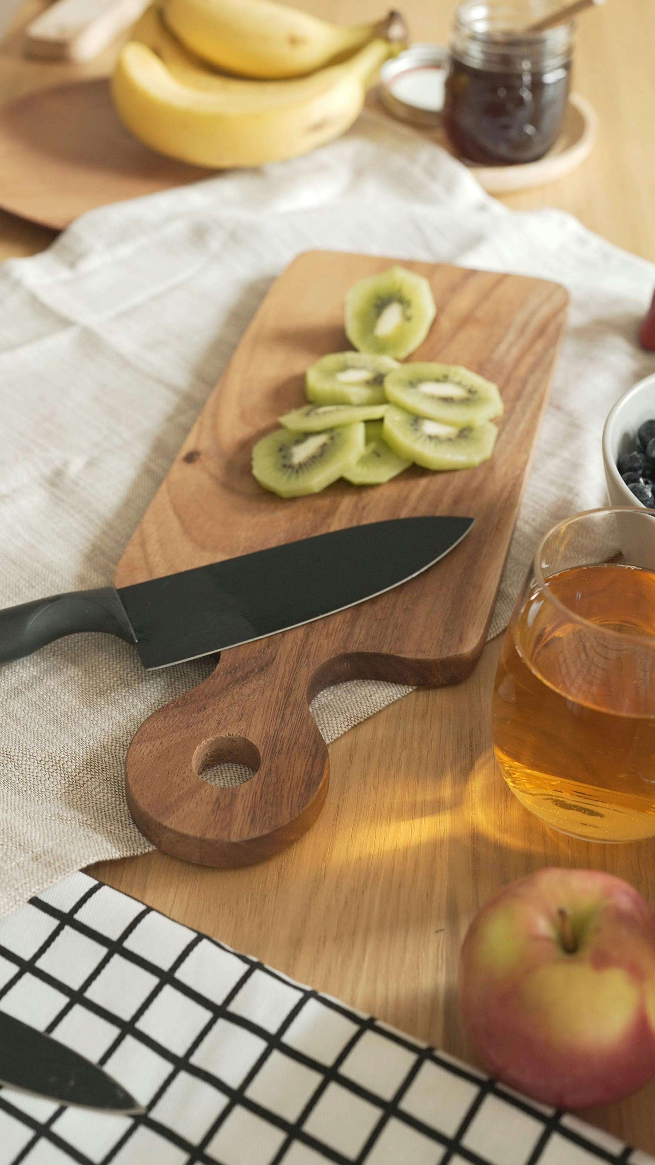 Sliced Kiwi on a Chopping Board · Free Stock Video