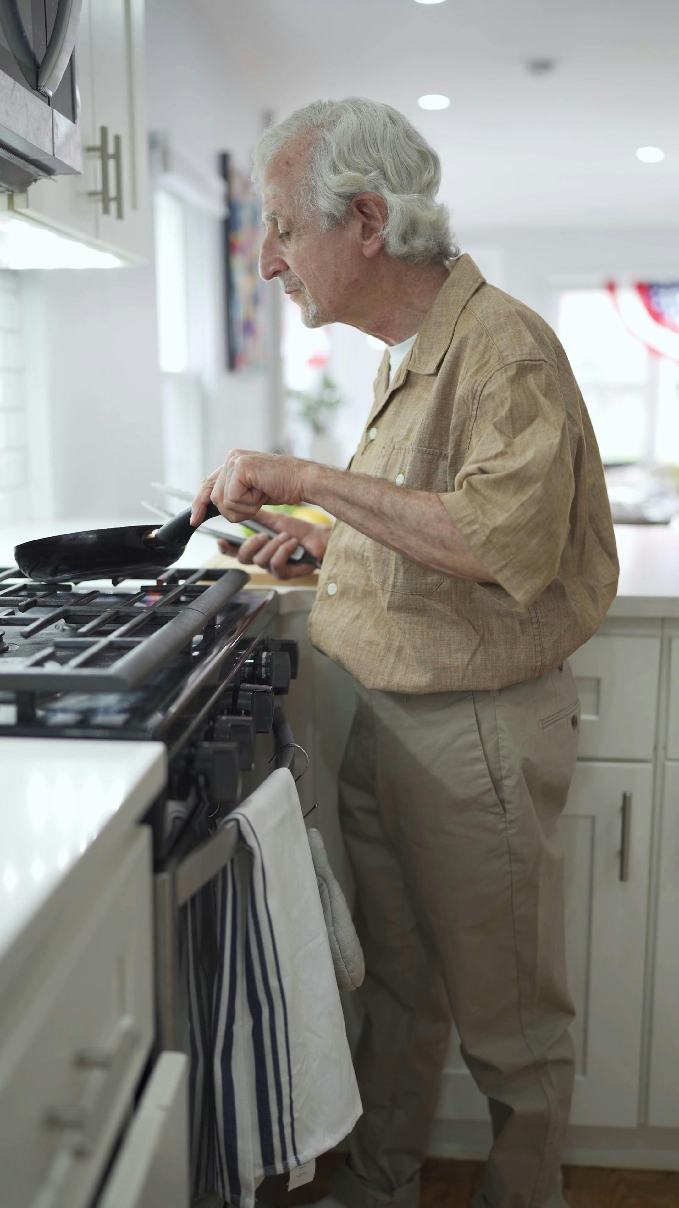 Elderly Man Cooking · Free Stock Video