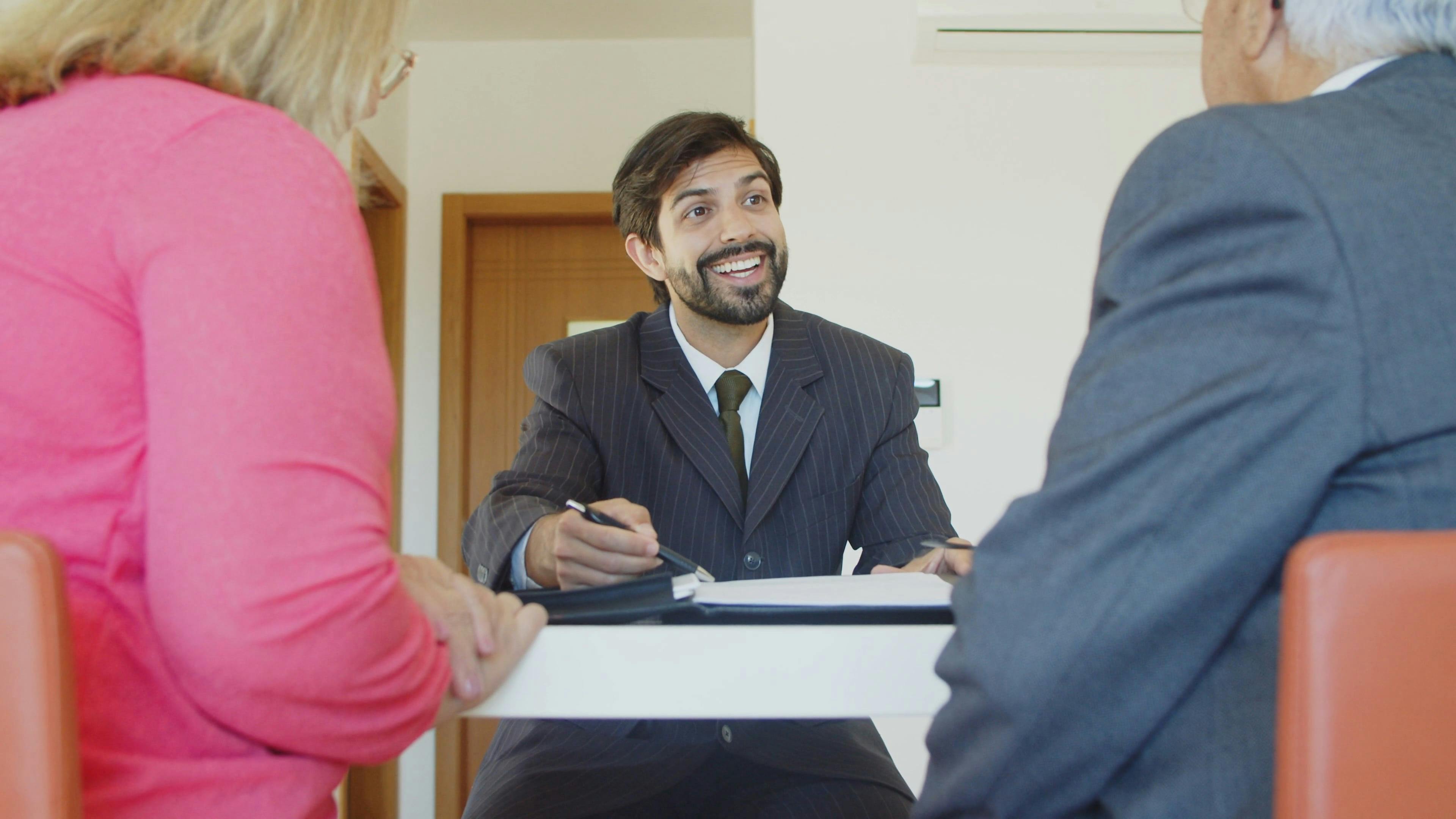 Real Estate Agent Talking to His Clients Free Stock Video Footage ...