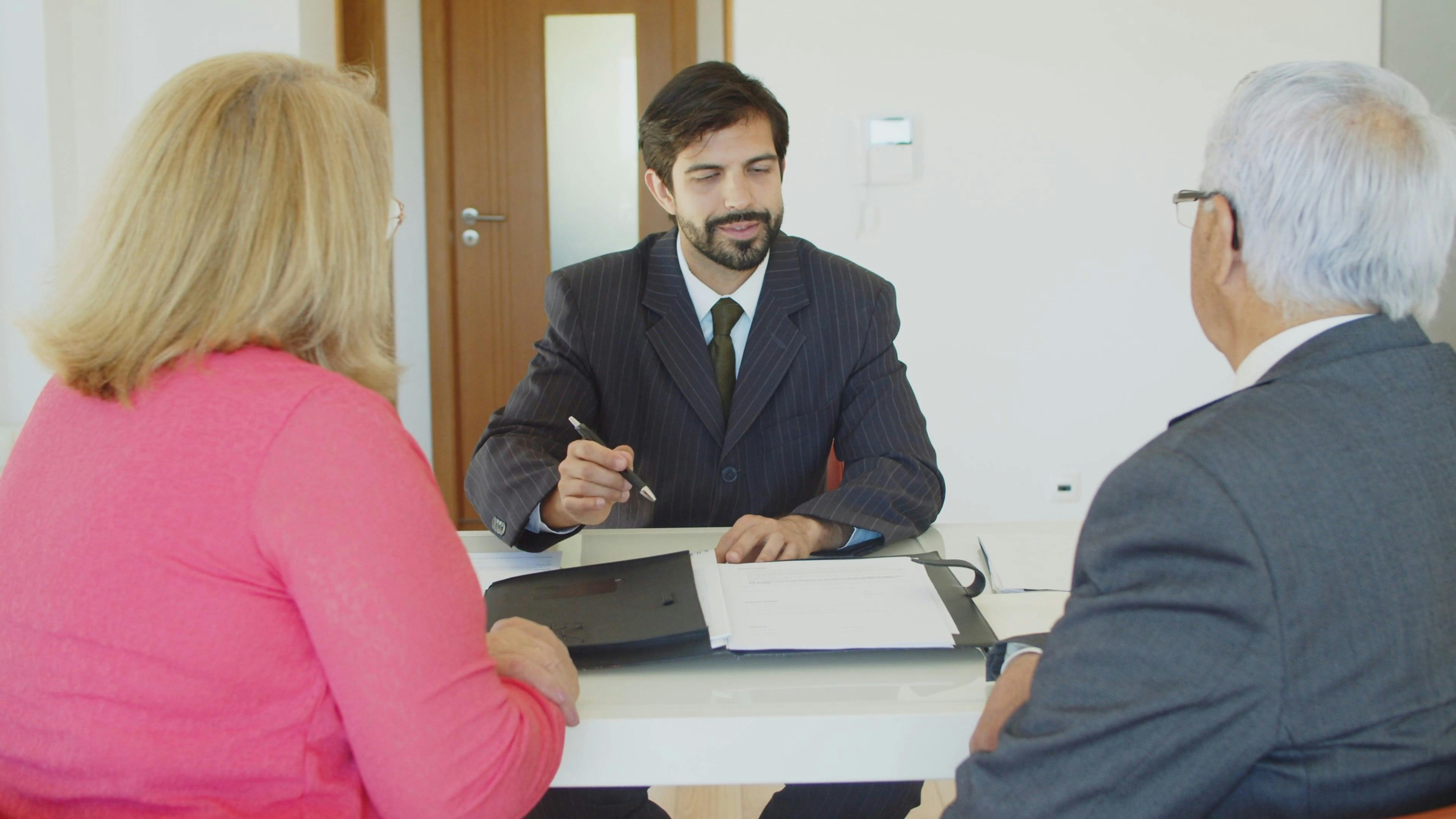 Real Estate Agent Talking to His Clients Free Stock Video Footage ...